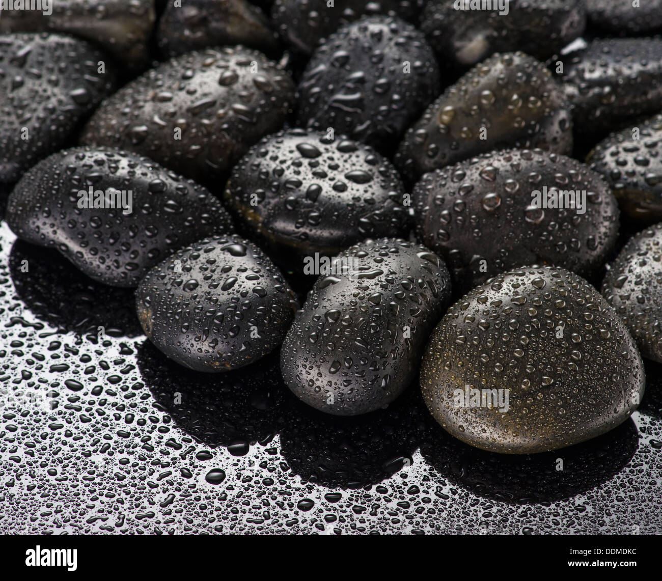 Black stone spa in droplets hi-res stock photography and images - Alamy