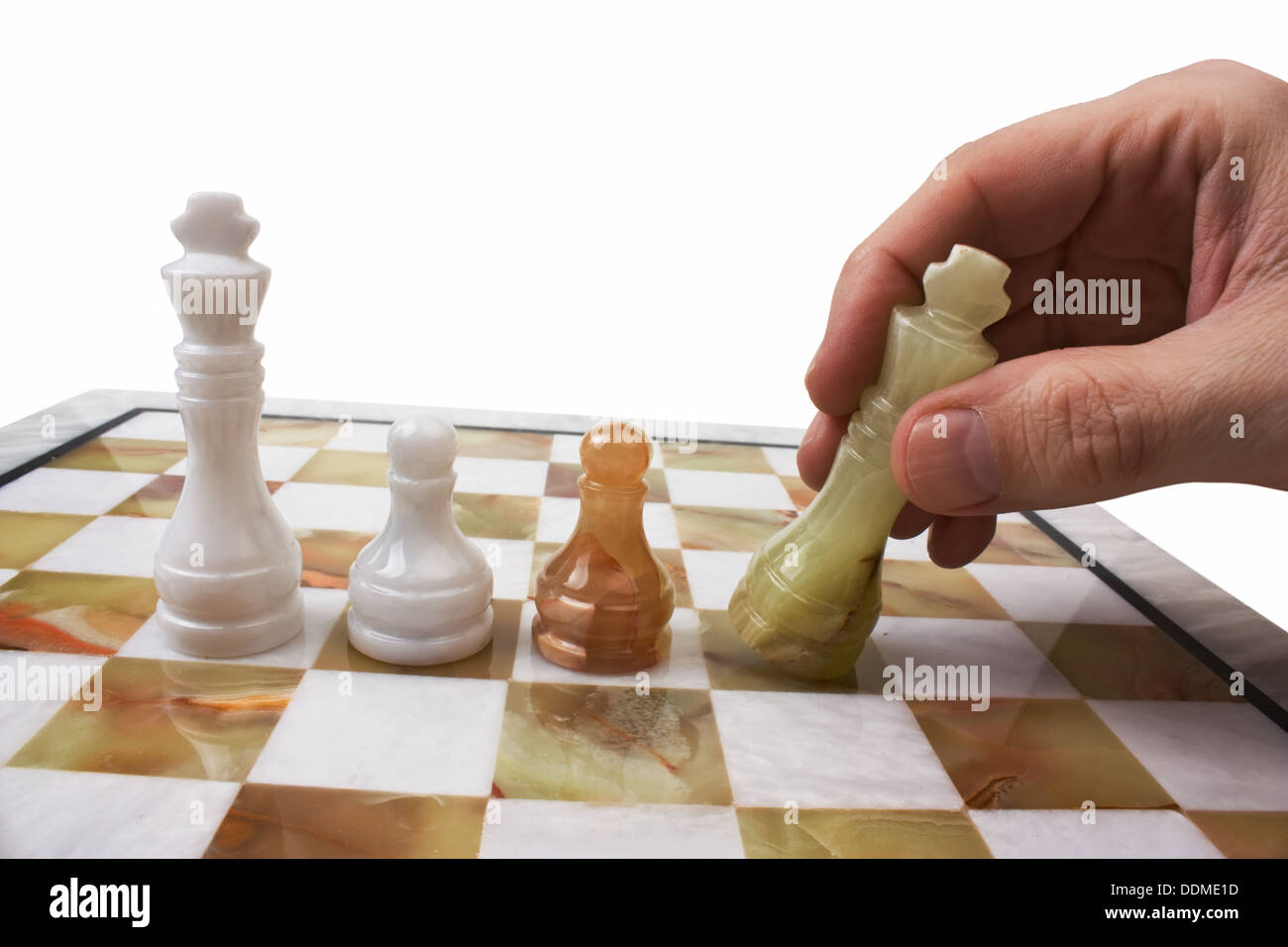 hand poses a chess piece on the board isolated on white background ...
