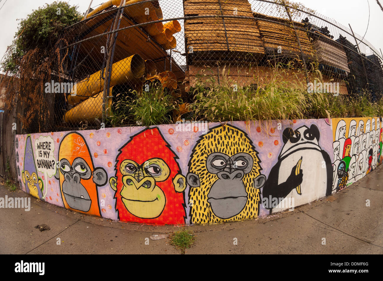 Murals grace the walls of the Welling Court Mural Project in the ...