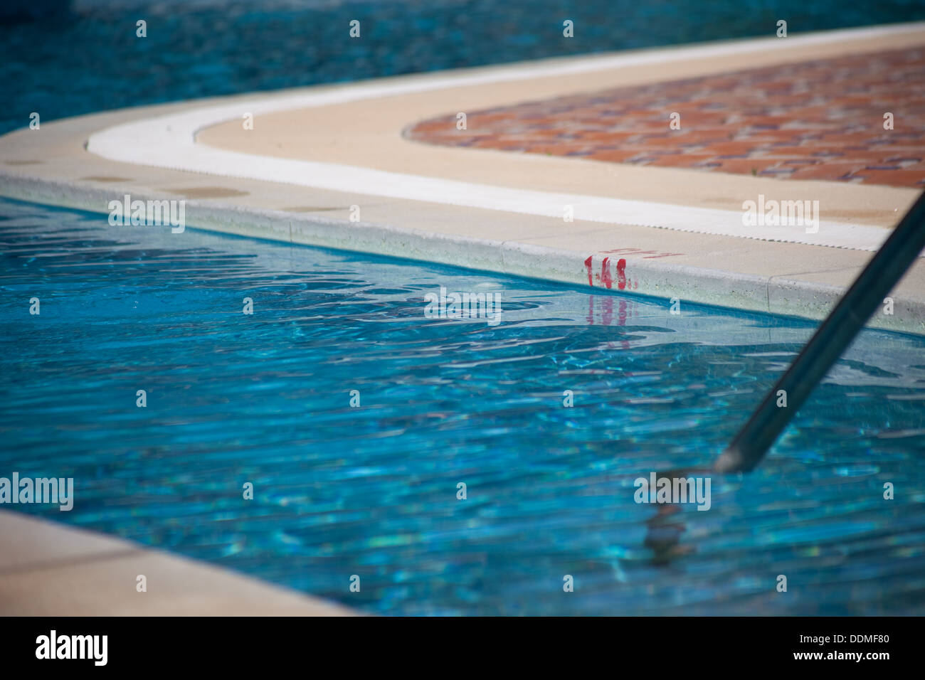 Swimming pool with depth mark Stock Photo - Alamy