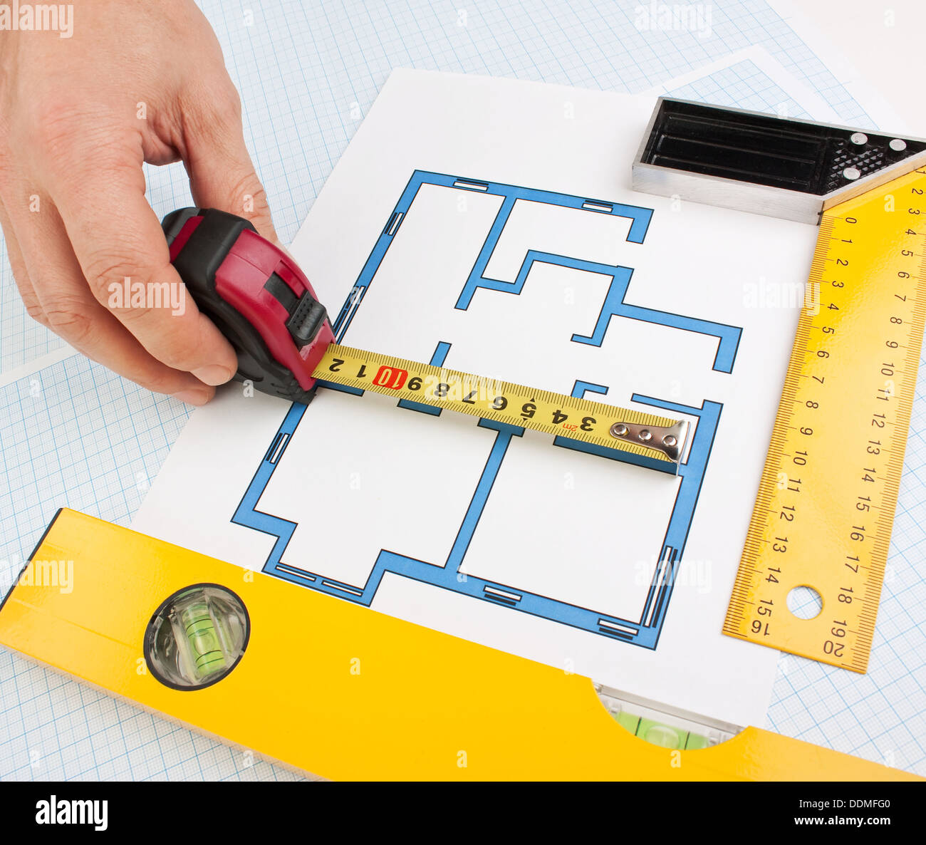 development drawings and tools on graph paper Stock Photo - Alamy