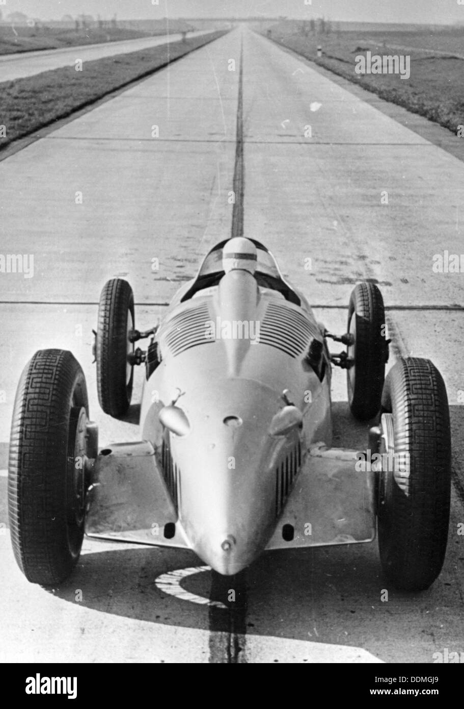 Bernd Rosemeyer in Auto Union record-breaking car, 1937. Artist ...