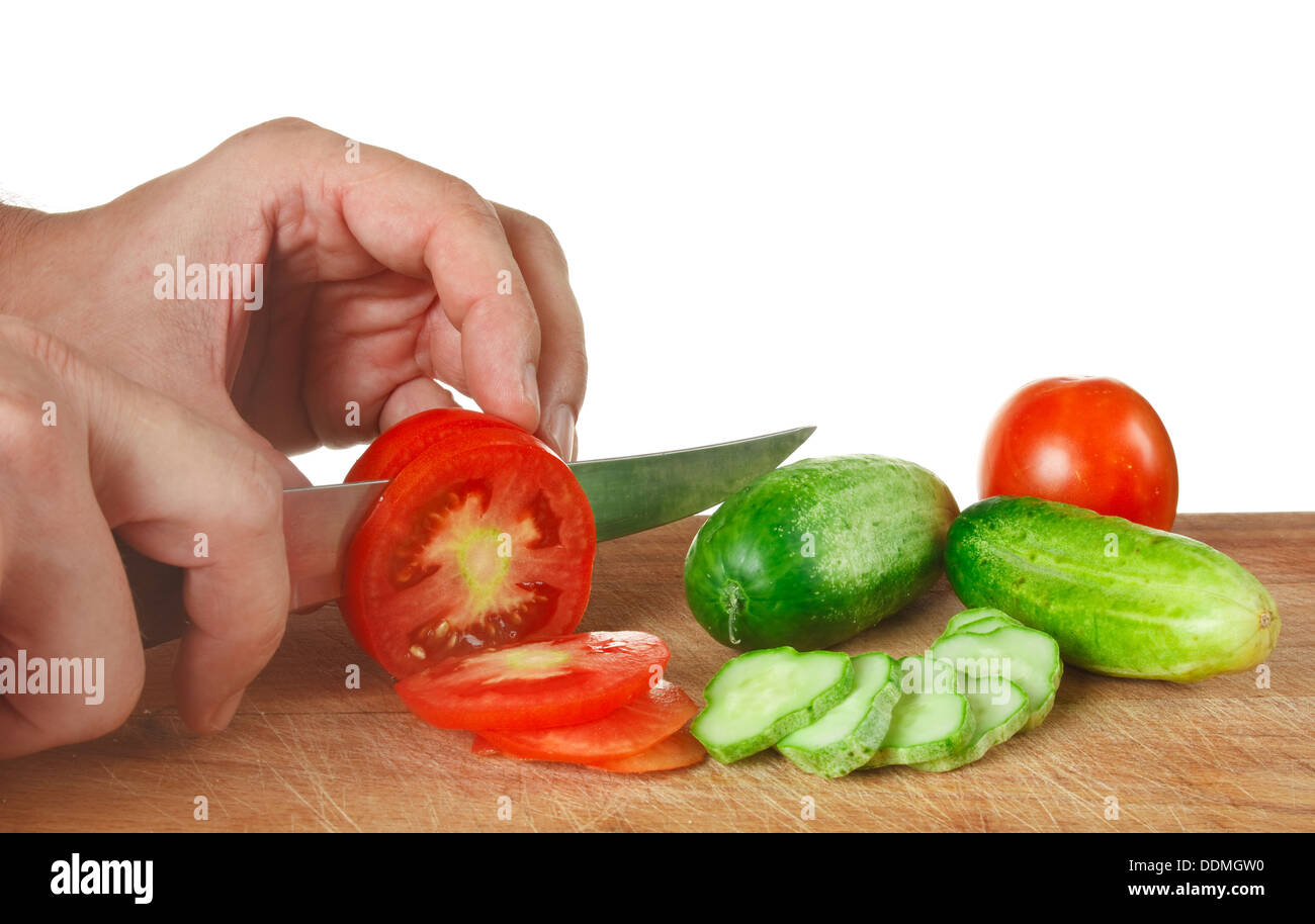 chop tomatoes and cucumbers isolated on white background Stock Photo ...