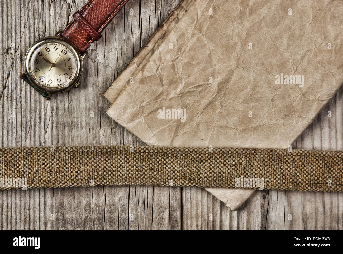 vintage paper and old broken watch on wooden boards Stock Photo - Alamy