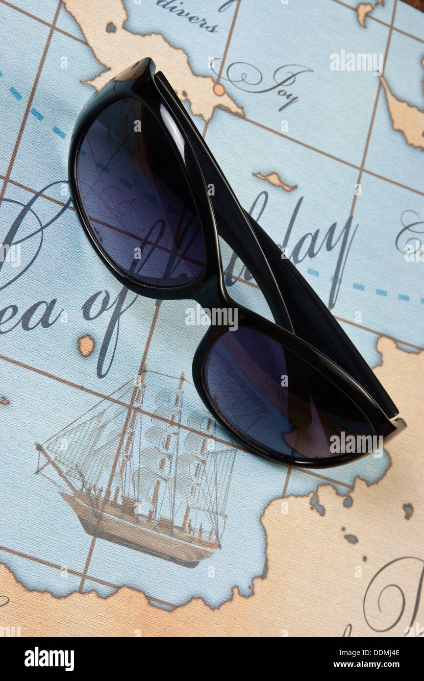 Sunglasses are on the map Stock Photo - Alamy