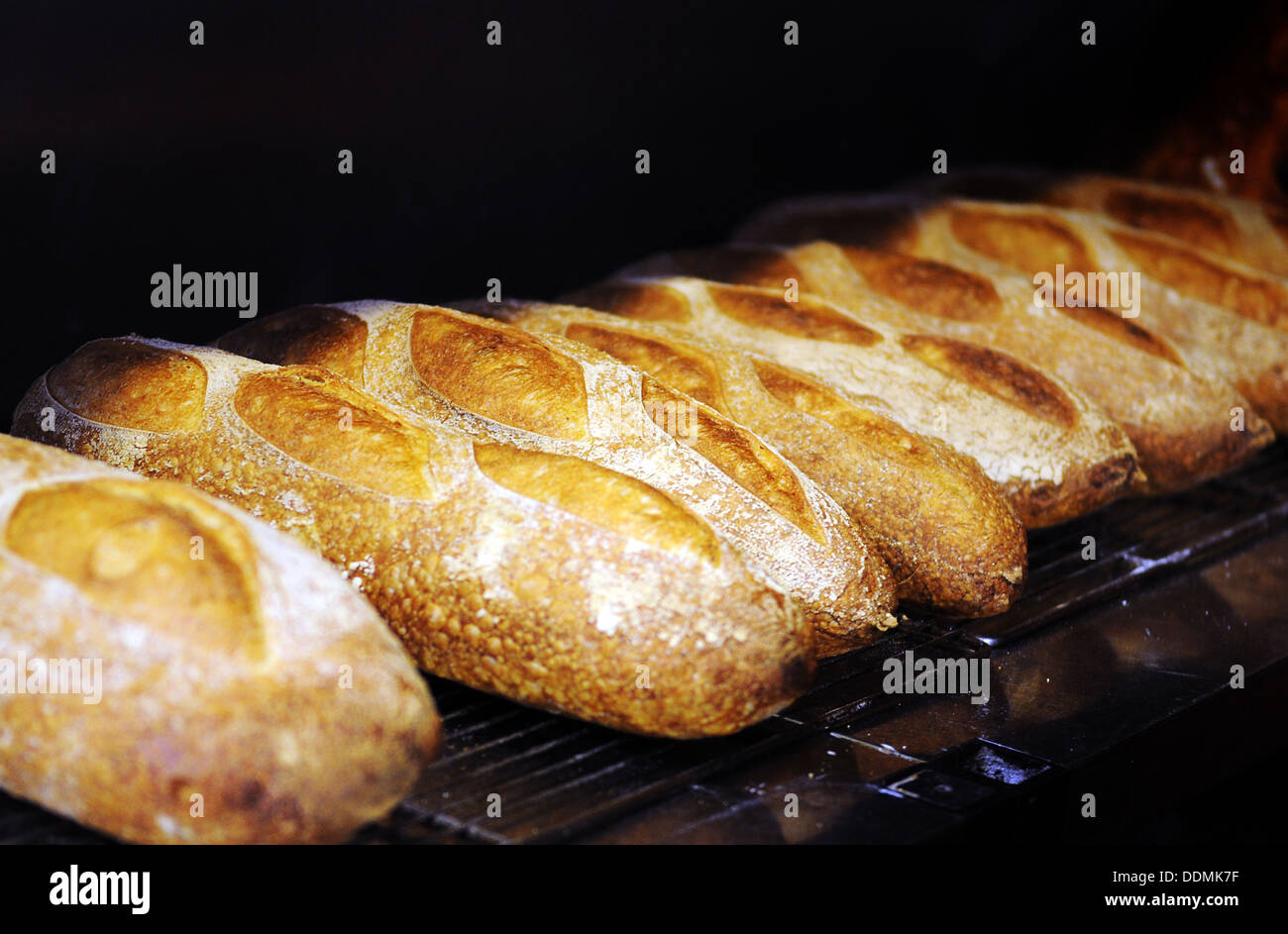 Bread pieces seen in a oven in a Spanish bakery Stock Photo - Alamy