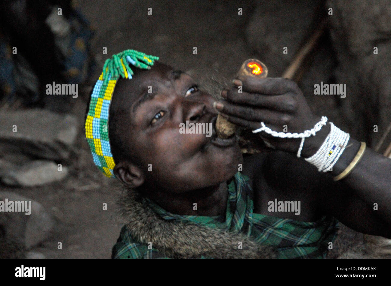 African tribesmen drug smoking. Tanzania Collection Stock Photo - Alamy