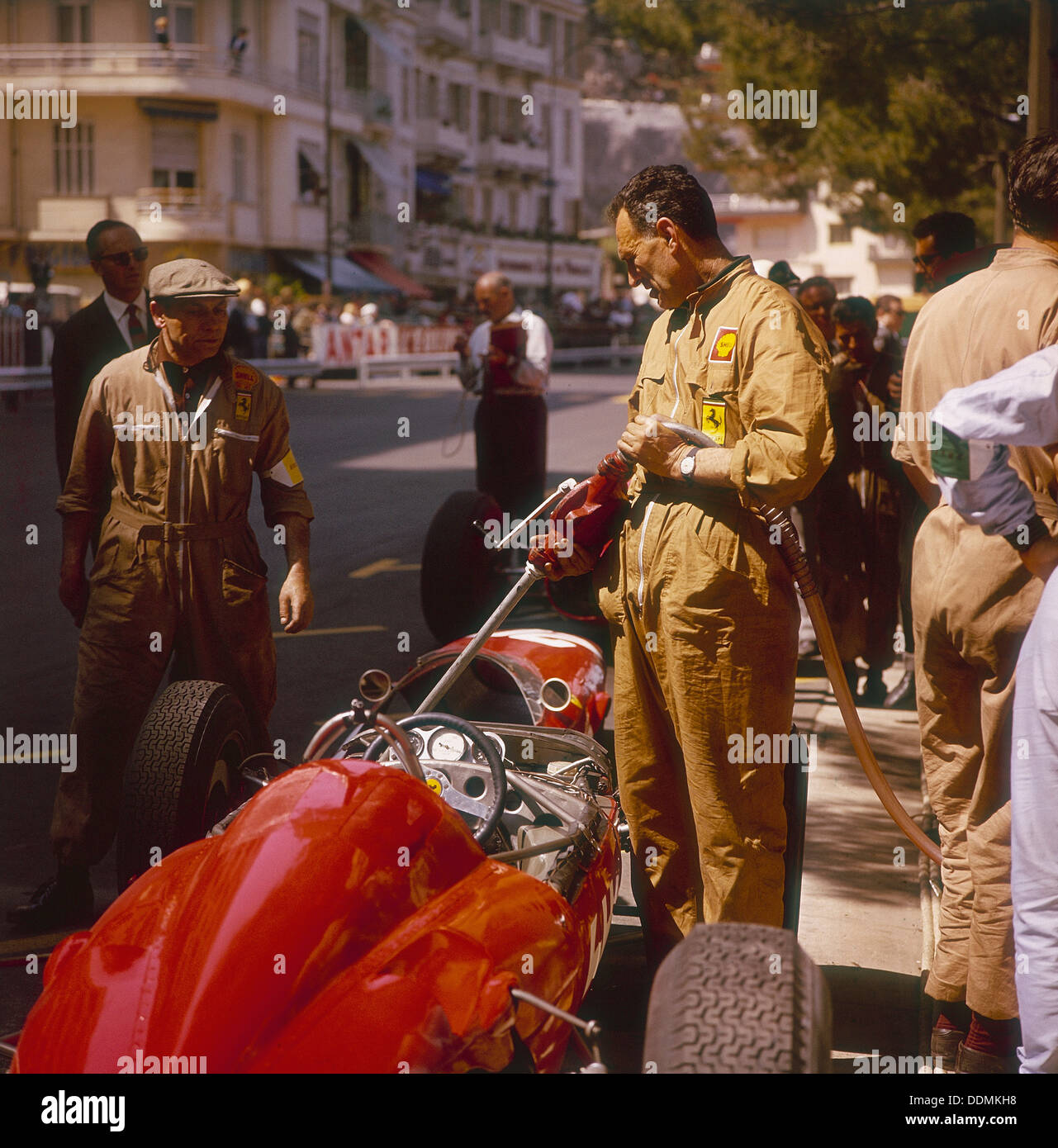 A Ferrari team member filling a car with fuel, Monaco Grand Prix, Monte ...