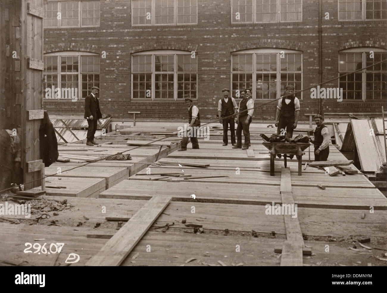 Builders at work, Rowntree factory, York, Yorkshire, 1907. Artist ...