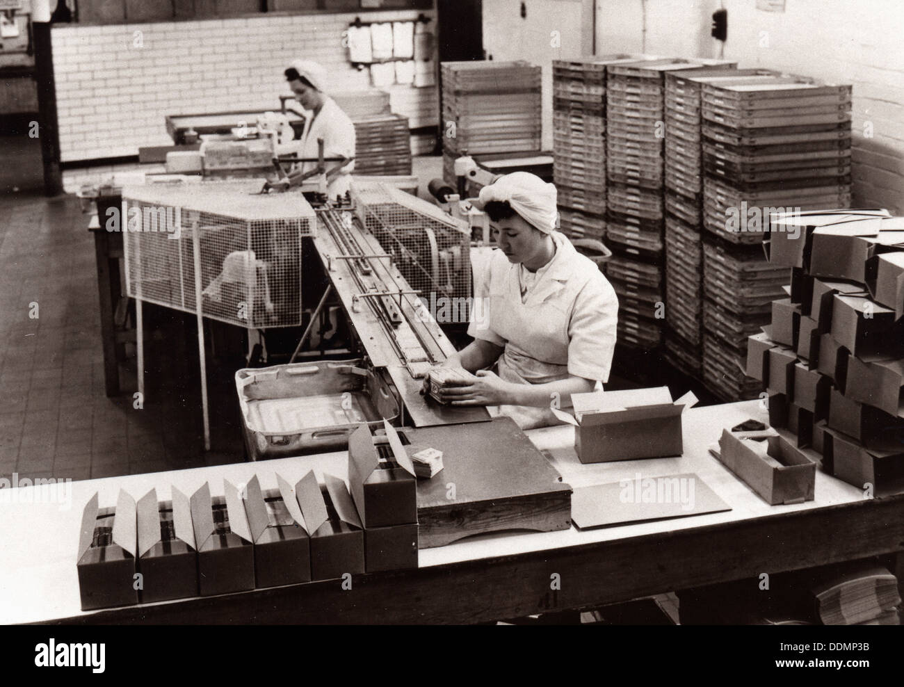 Girls packing Kit Kat, Rowntree factory, York, Yorkshire, 1956. Artist ...