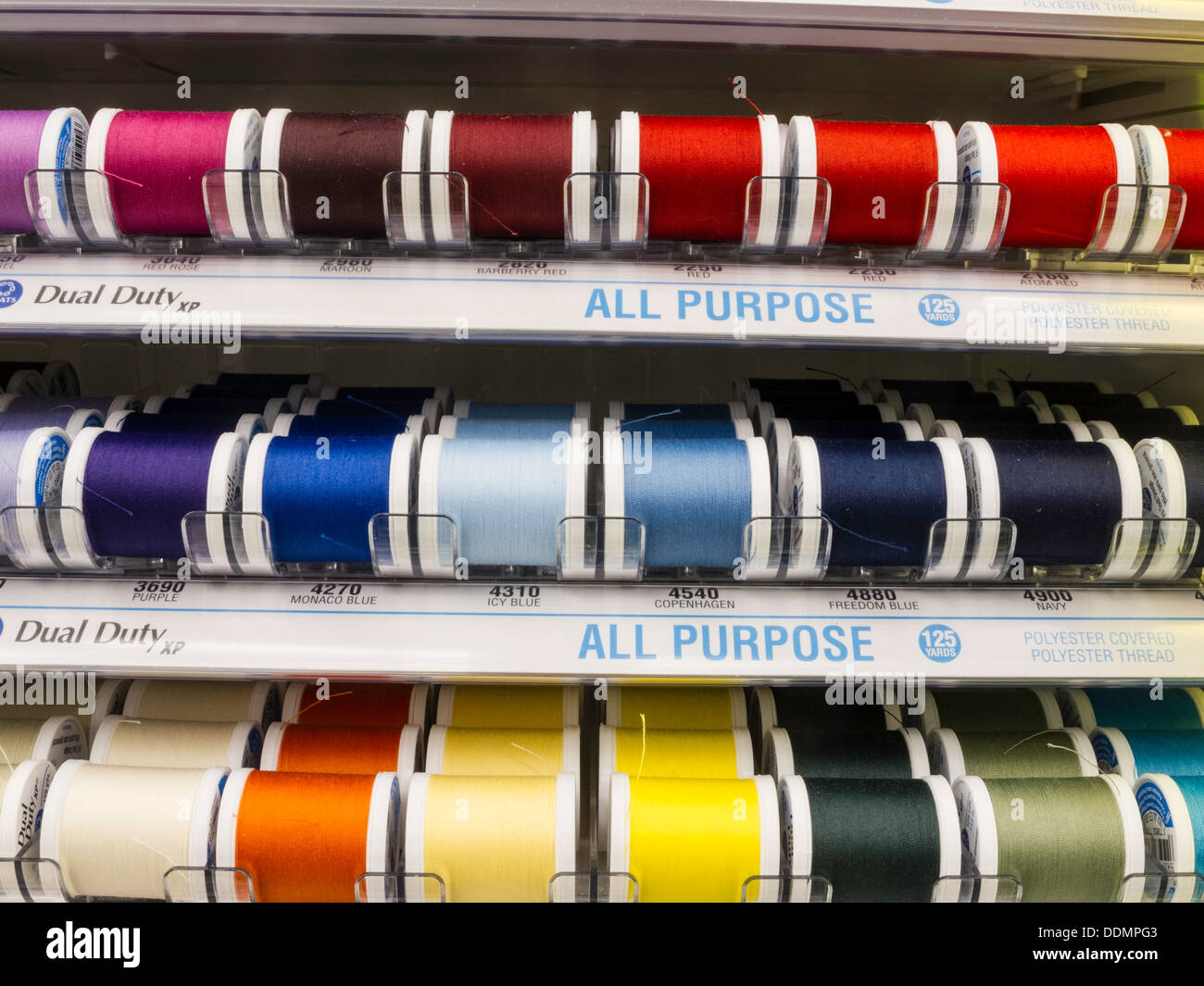 Spools of Thread Display Stock Photo - Alamy