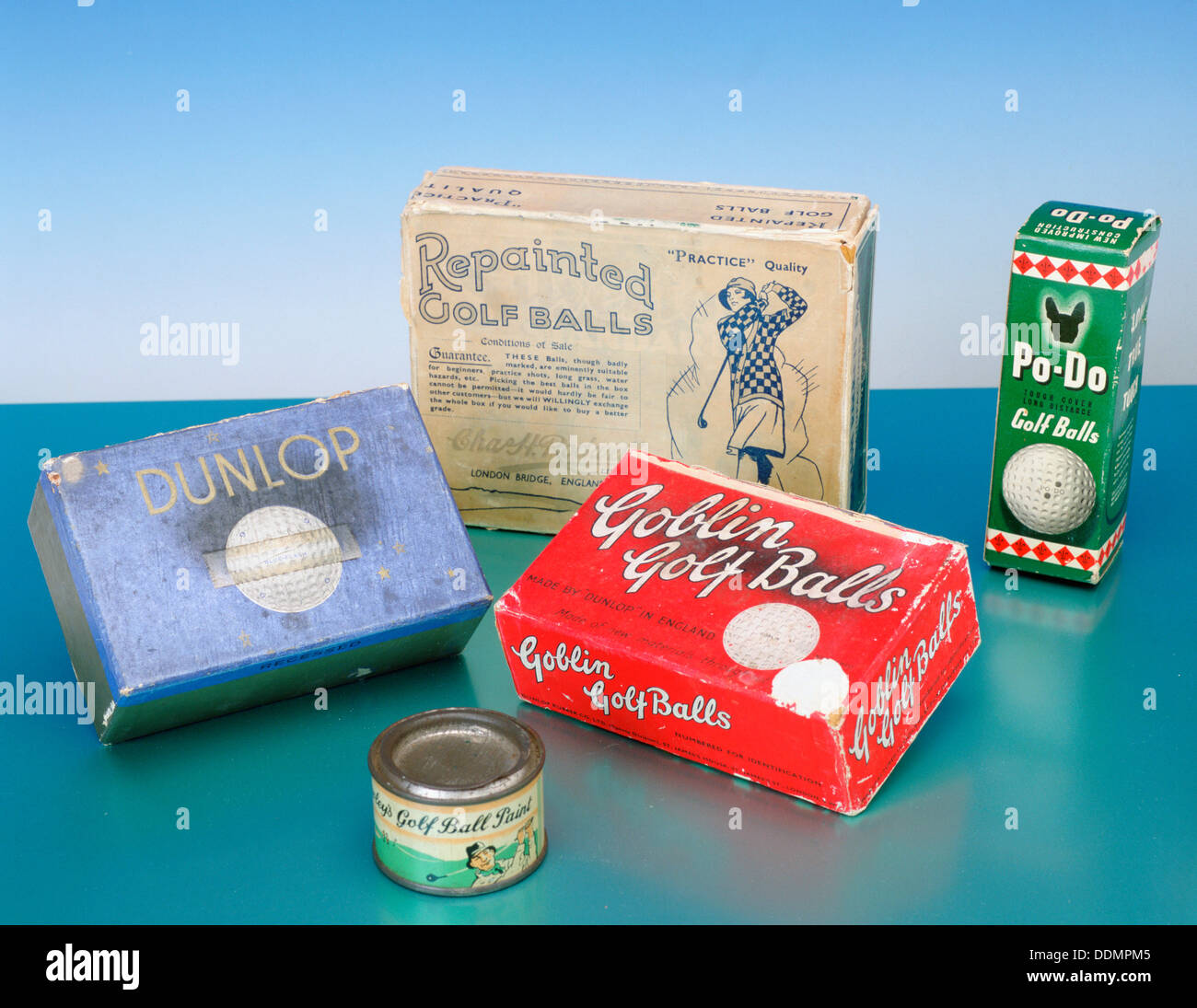 Golf ball boxes and tin of golf ball paint, 1920-1930. Artist: Unknown ...