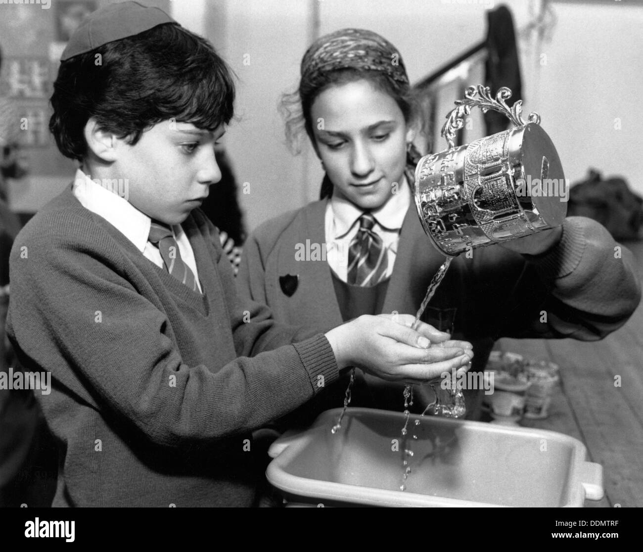 Ritual hand washing Black and White Stock Photos & Images - Alamy