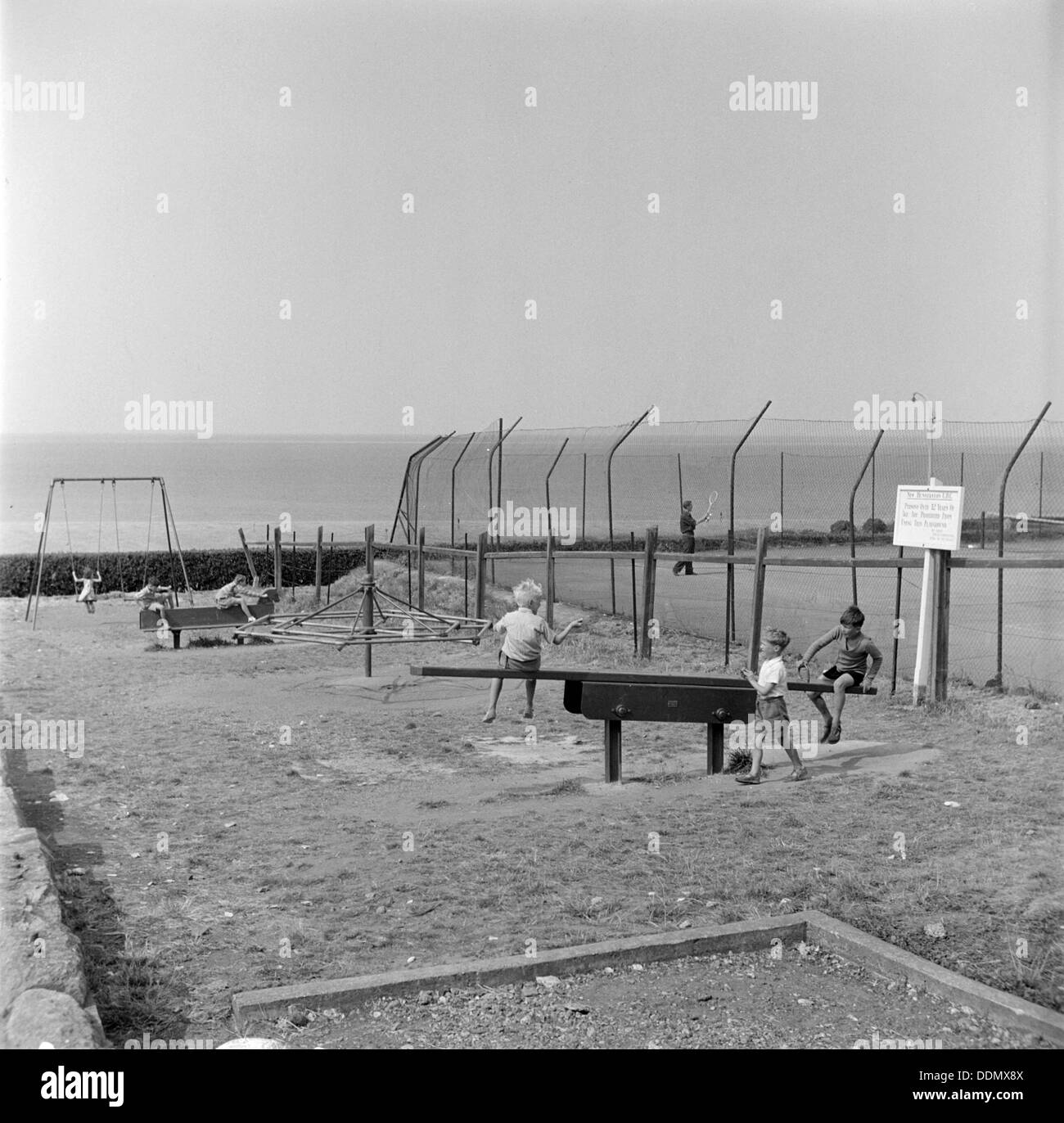 Children playing playground 1950s hi-res stock photography and images ...
