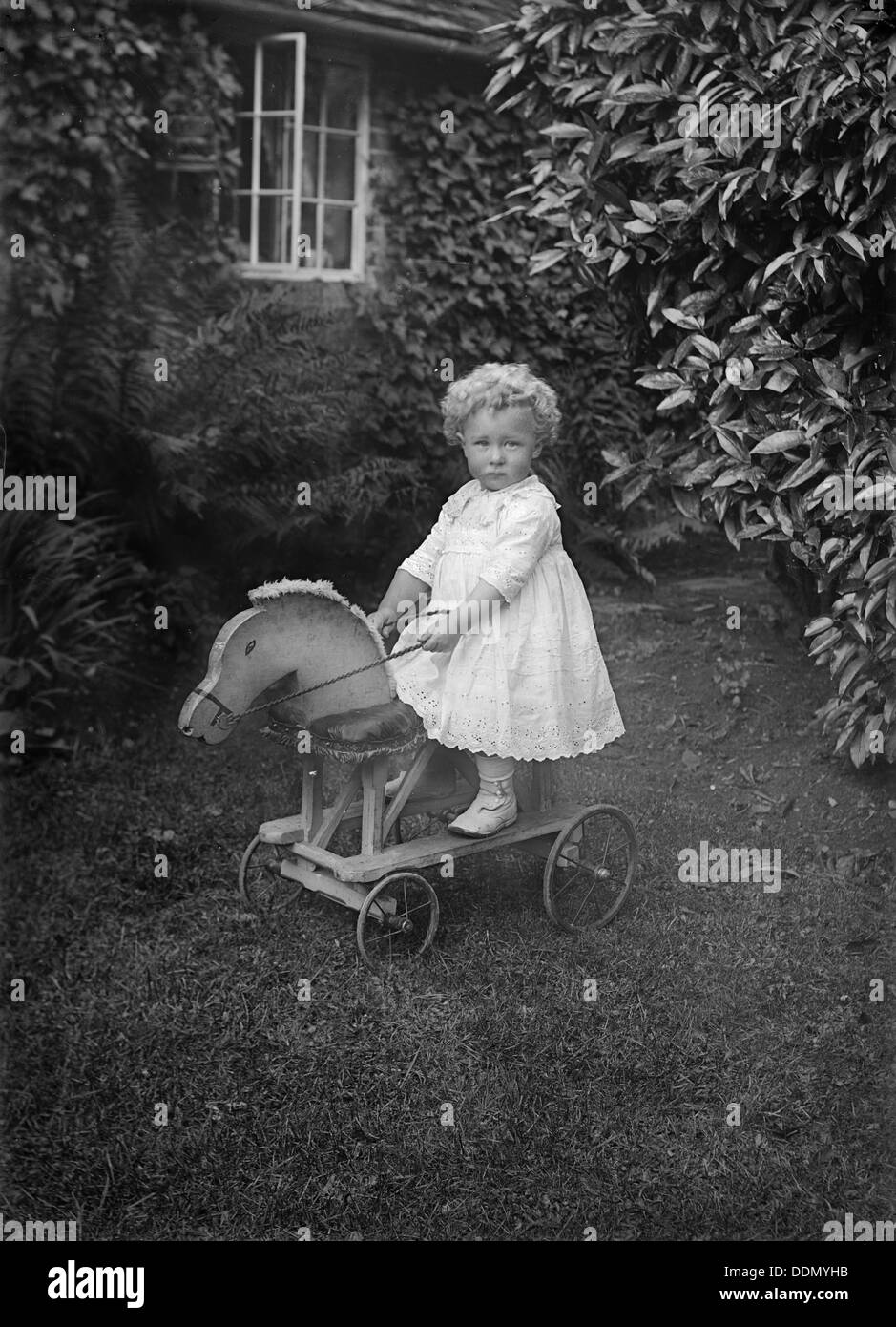 Child on white horse Black and White Stock Photos & Images - Alamy