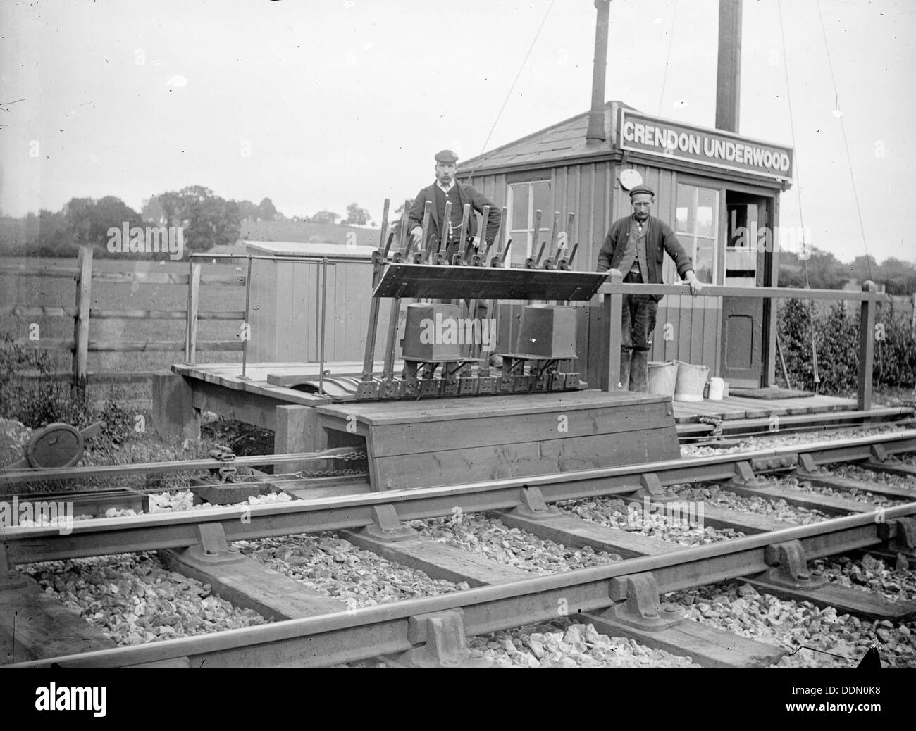 Signalmen pose outside a signal box near Grendon Underwood ...
