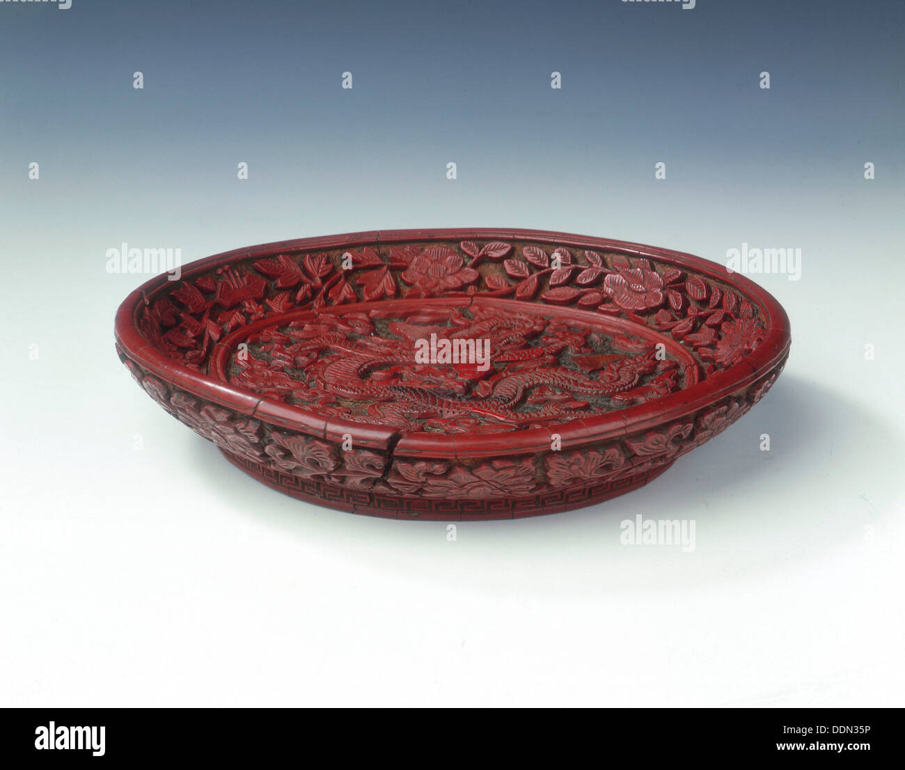 Carved red lacquer saucer with dragon amid clouds, Ming dynasty, China ...