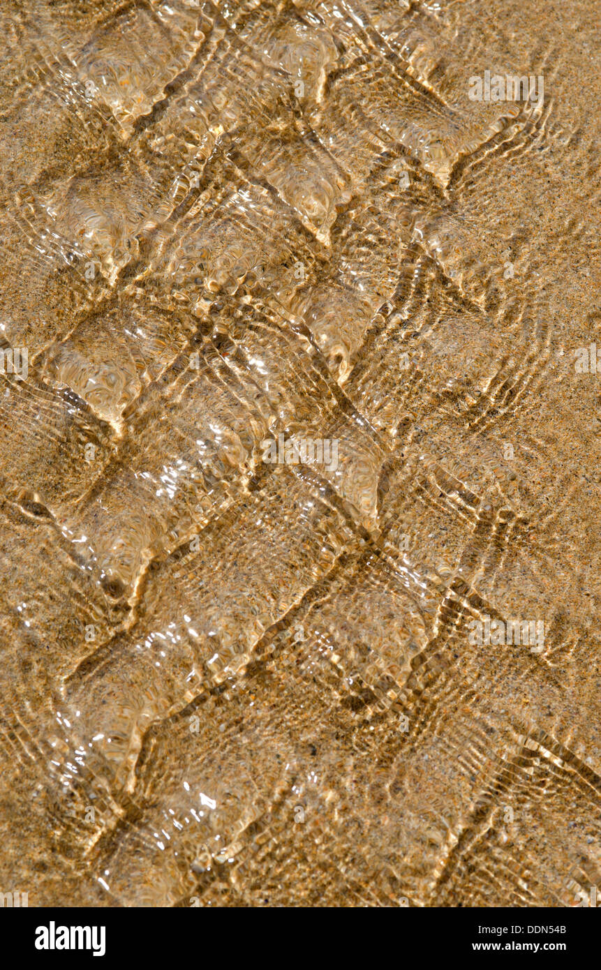 Water on sand texture Stock Photo - Alamy
