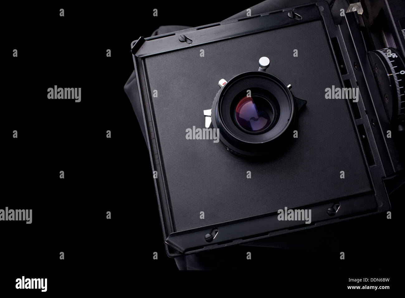 Old photo Camera on black background Stock Photo - Alamy