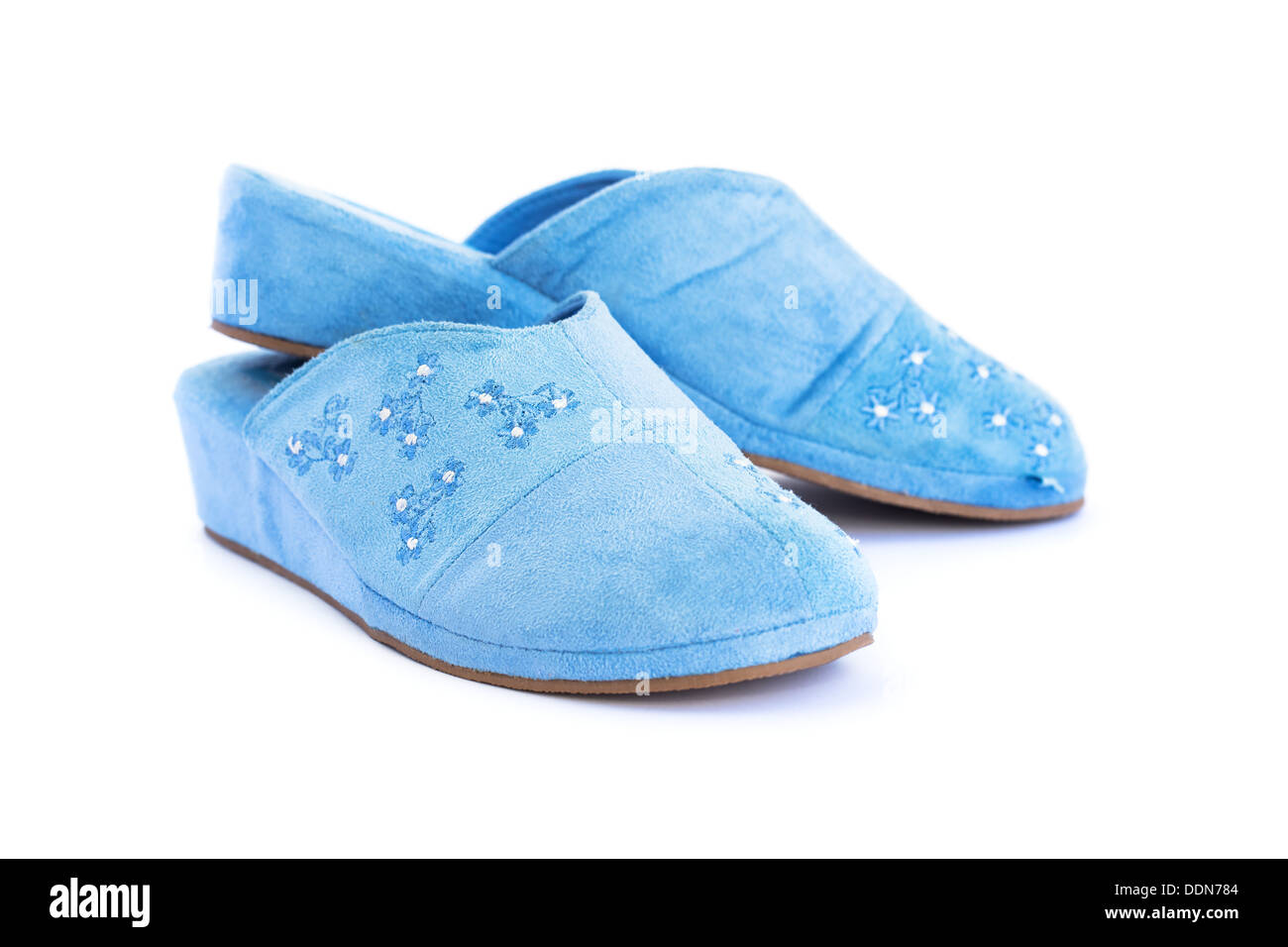 Blue slippers isolated on white background Stock Photo - Alamy