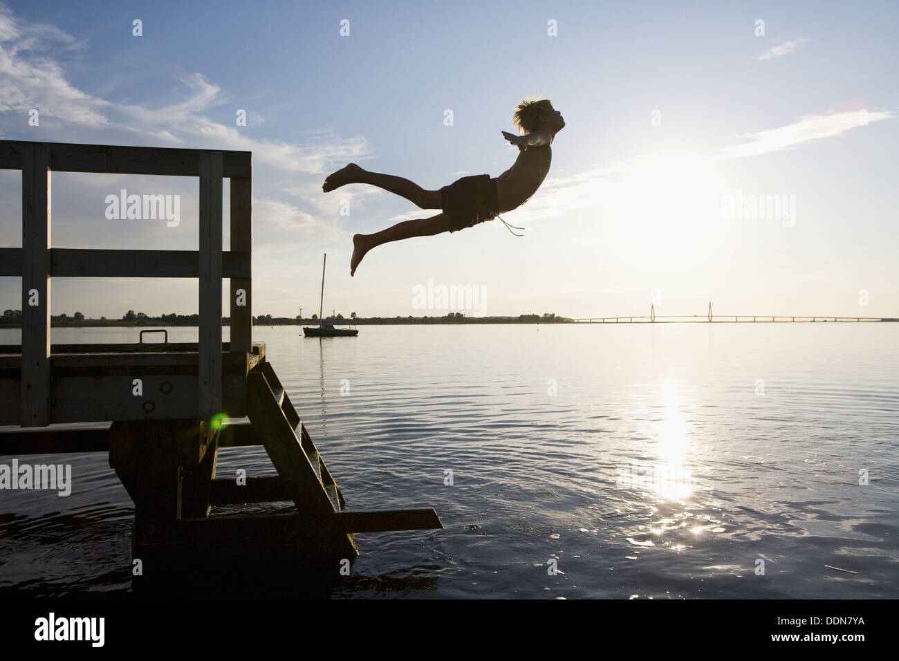 Boys diving pier hi-res stock photography and images - Alamy