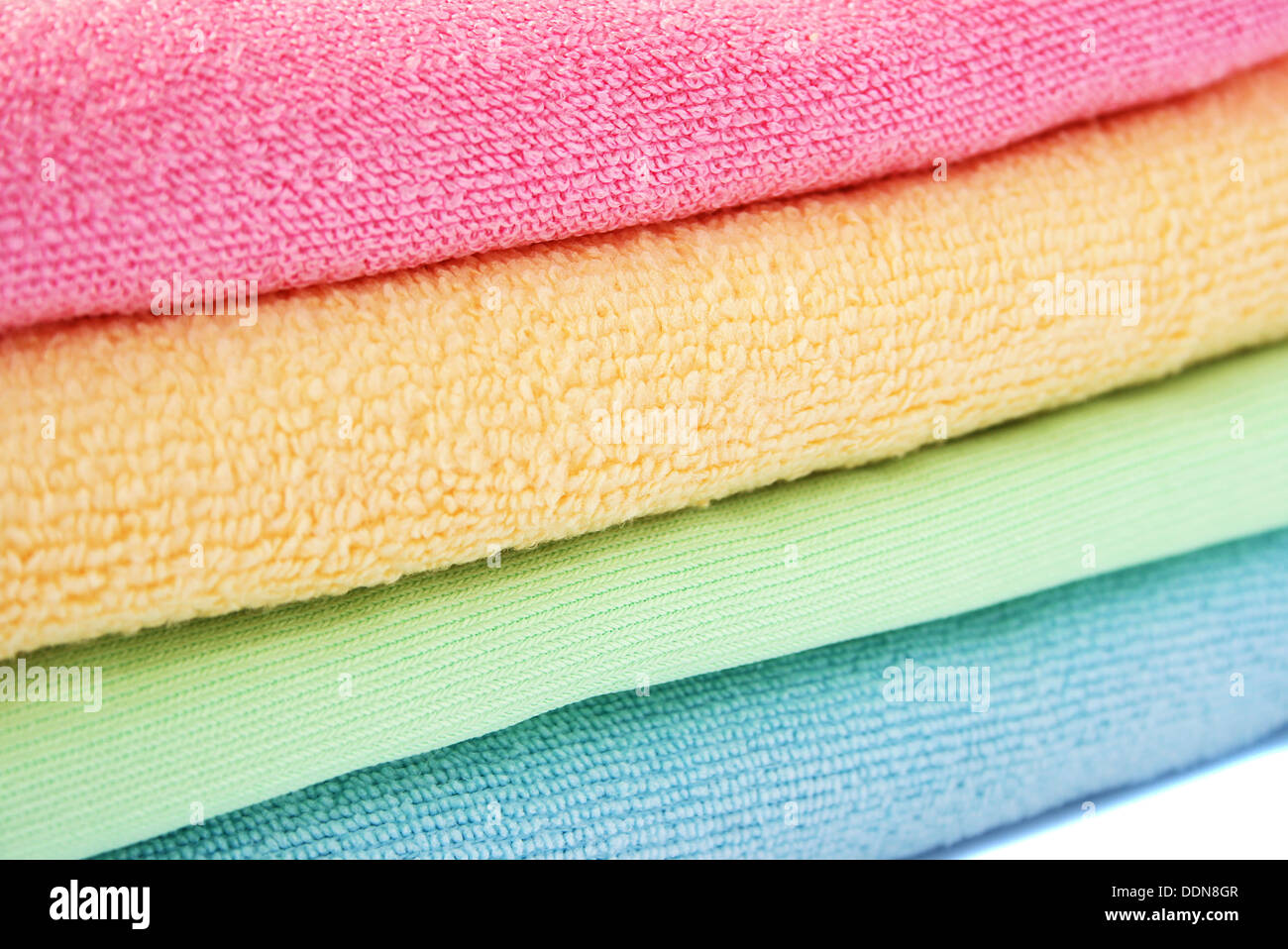 Colorful clothes on white background Stock Photo - Alamy