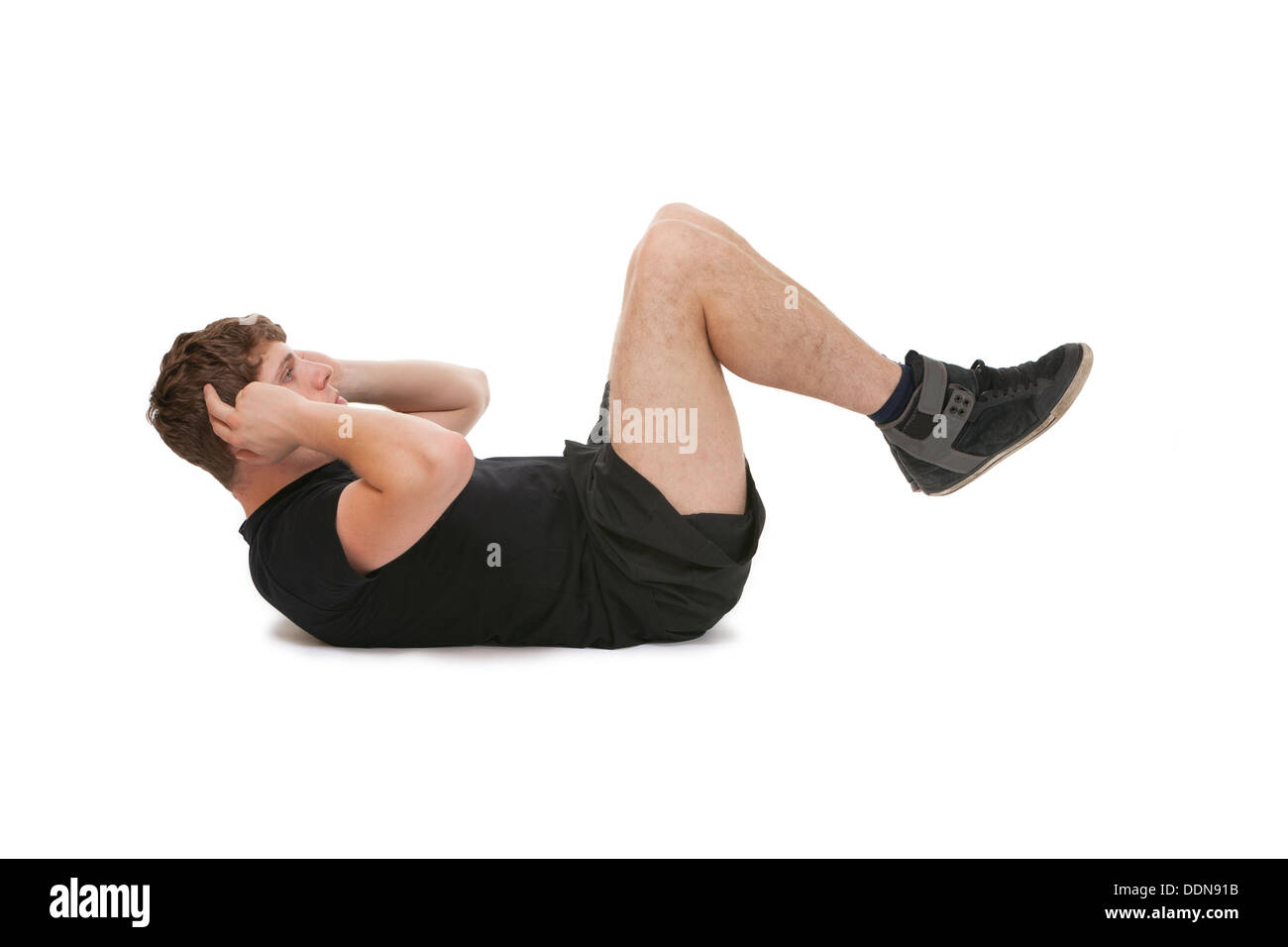 Young male athlete exercising on Cut Out Stock Images & Pictures - Alamy