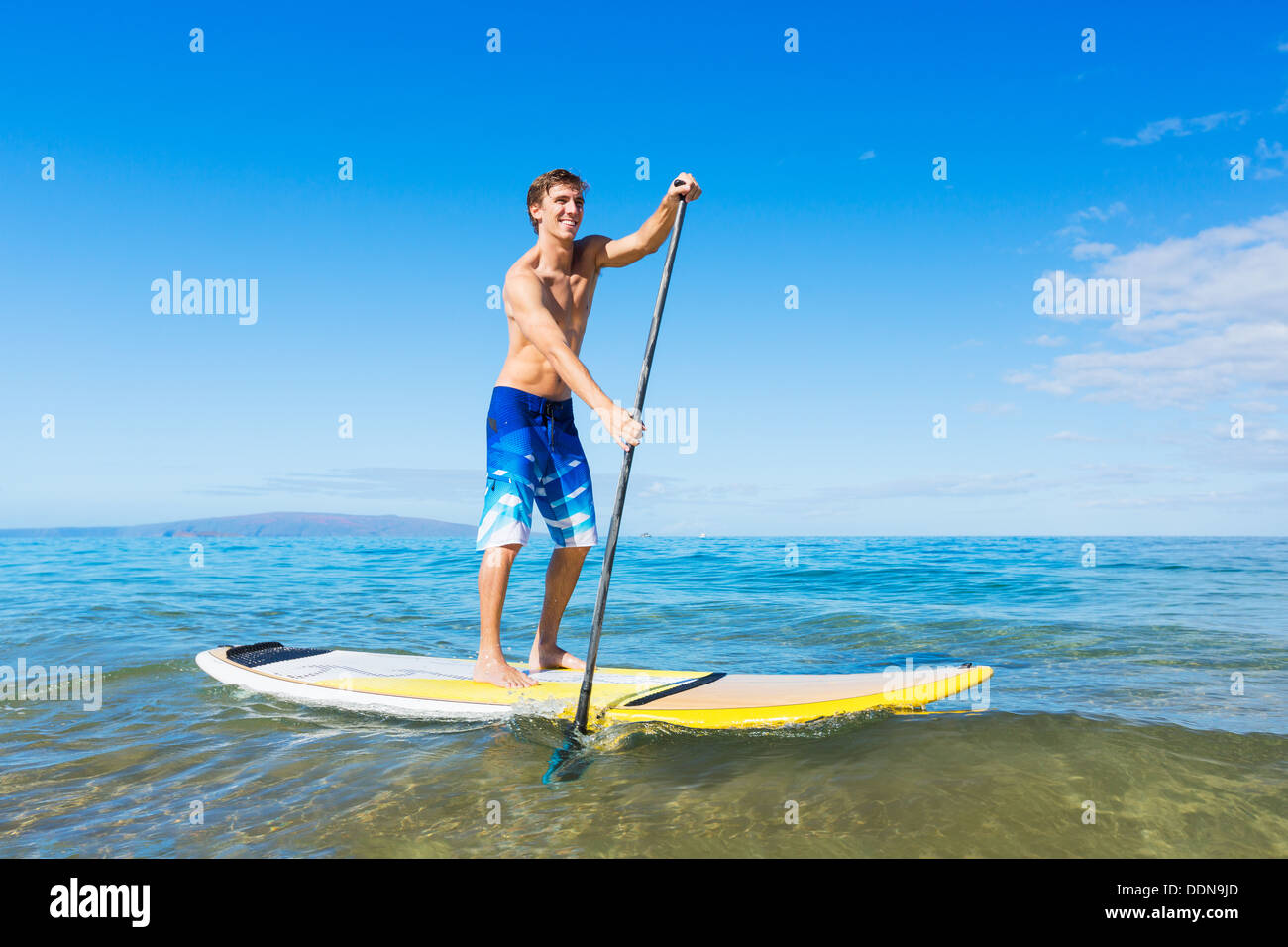 Man on stand up paddle board hi-res stock photography and images - Alamy