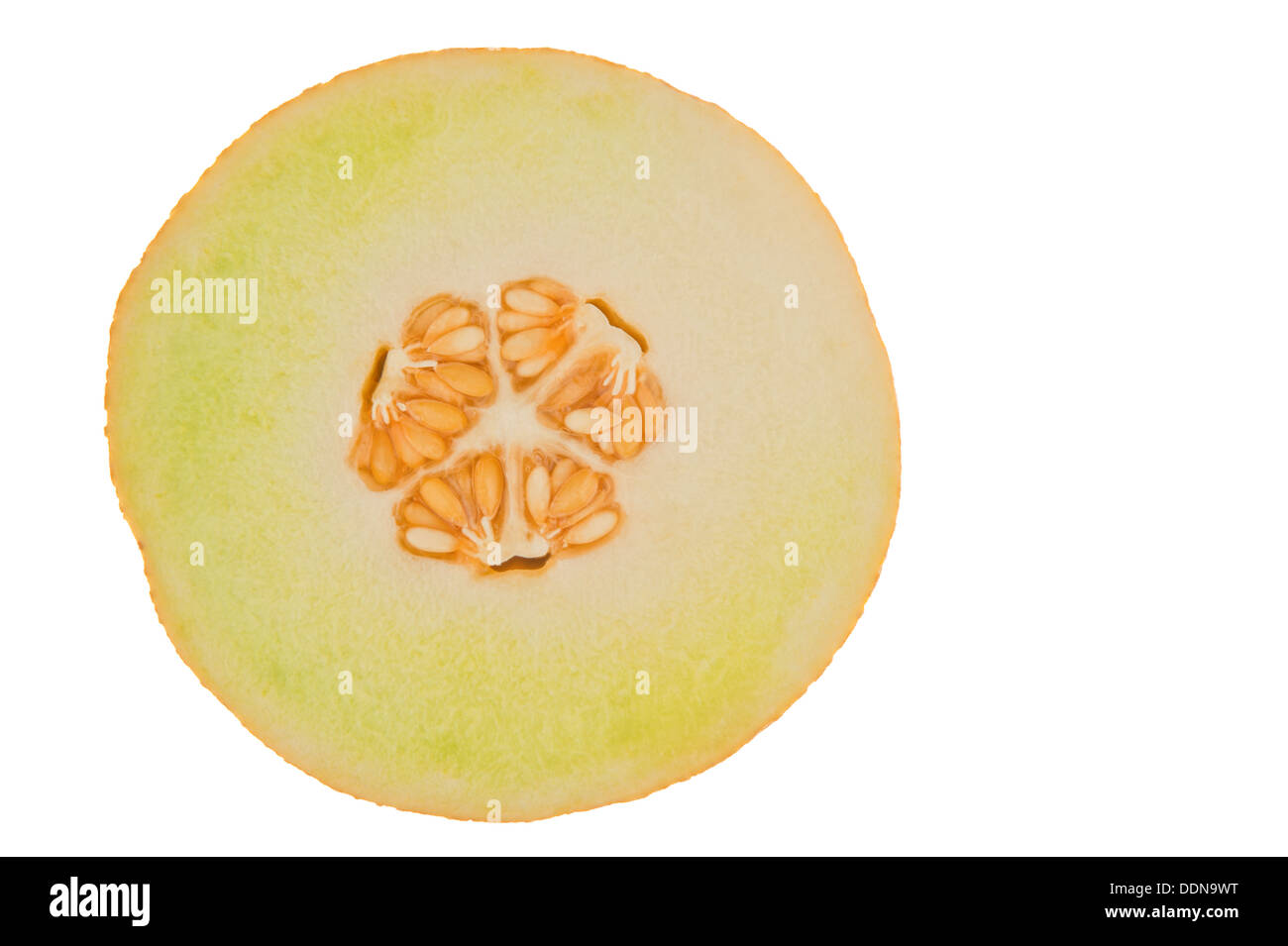 A sliced yellow melon with three sections core isolated in white Stock ...