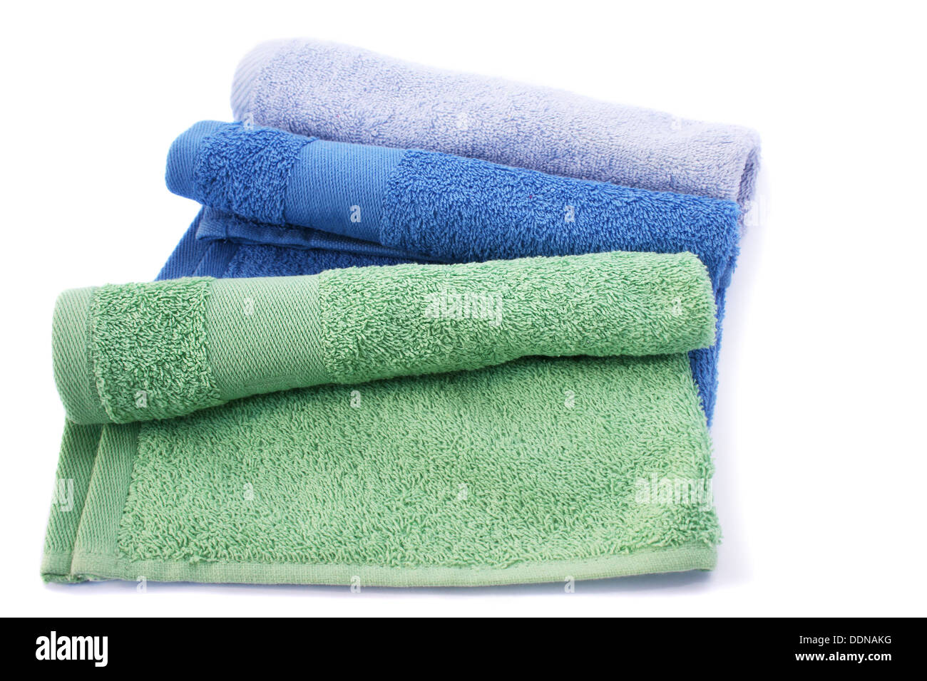 Colorful towels isolated on white background Stock Photo - Alamy