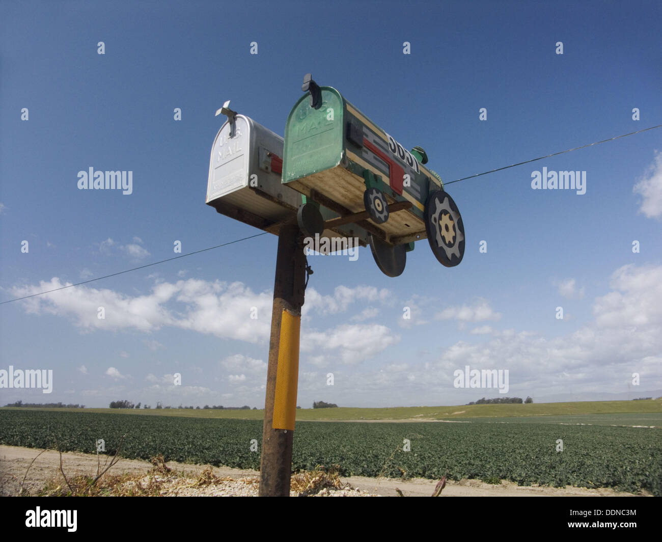 Tractor like mailboxes amidst farm fields in rural, gricultural Santa ...