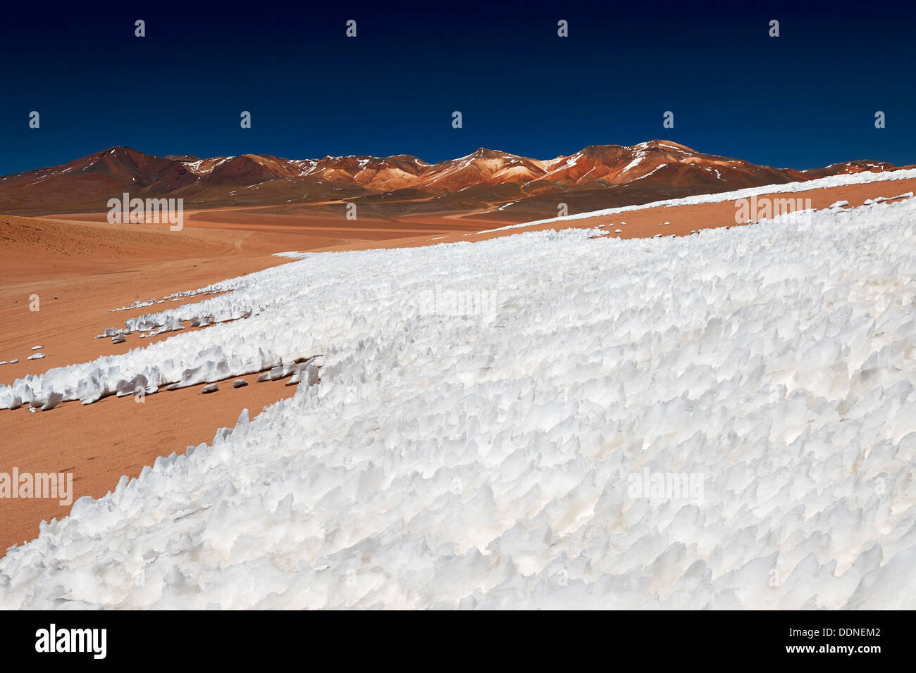 Ice and snow structures in front of mountains, Reserva Nacional de ...