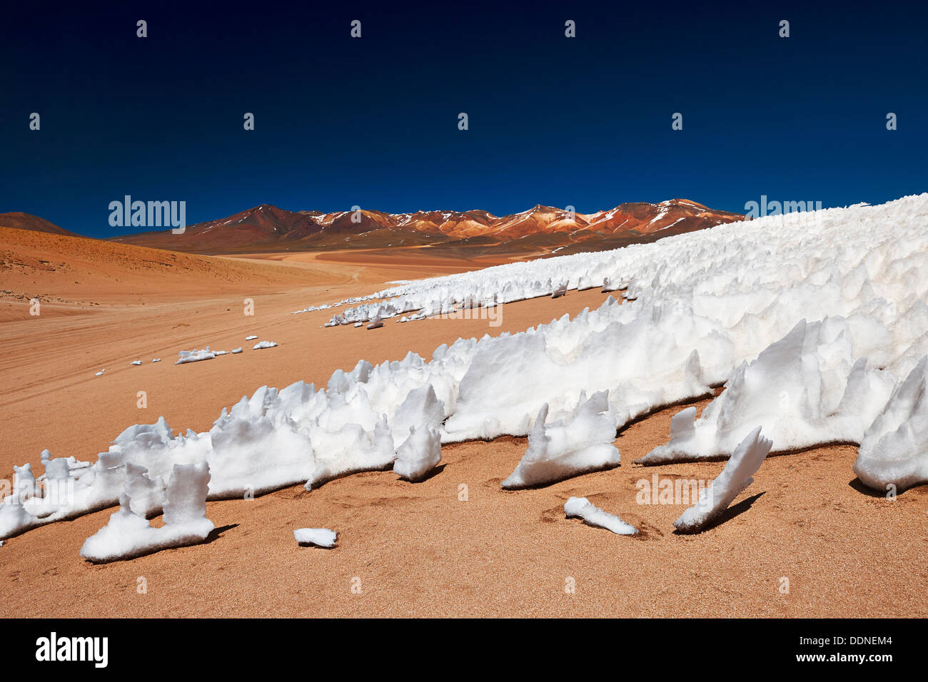 Ice and snow structures in front of mountains, Reserva Nacional de ...