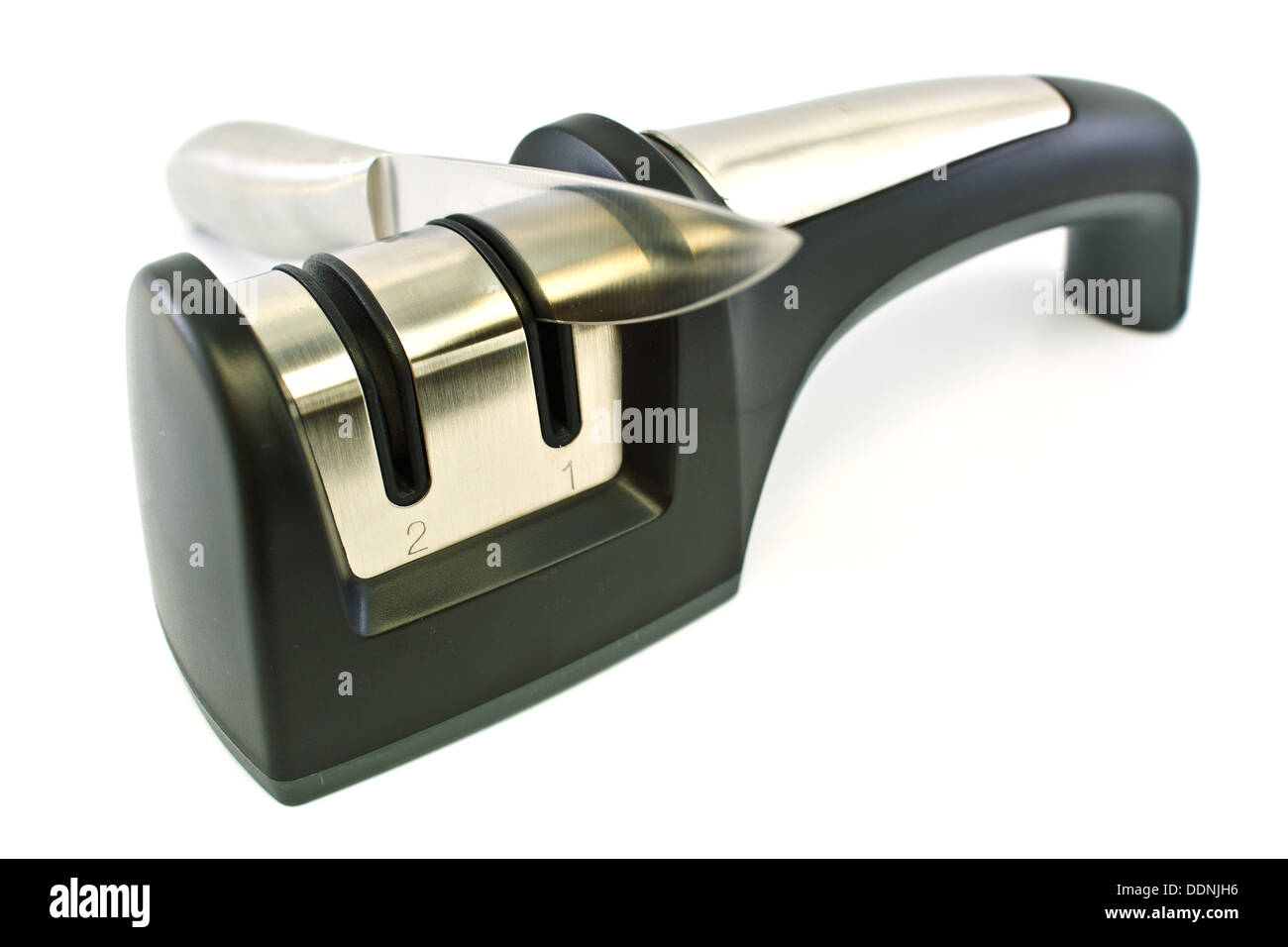 Whetstone knife using the handle on white background Stock Photo - Alamy
