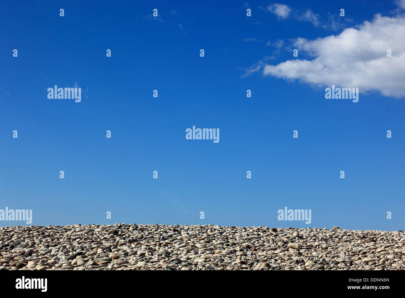 Stones, blue sky, large pebbles Stock Photo - Alamy