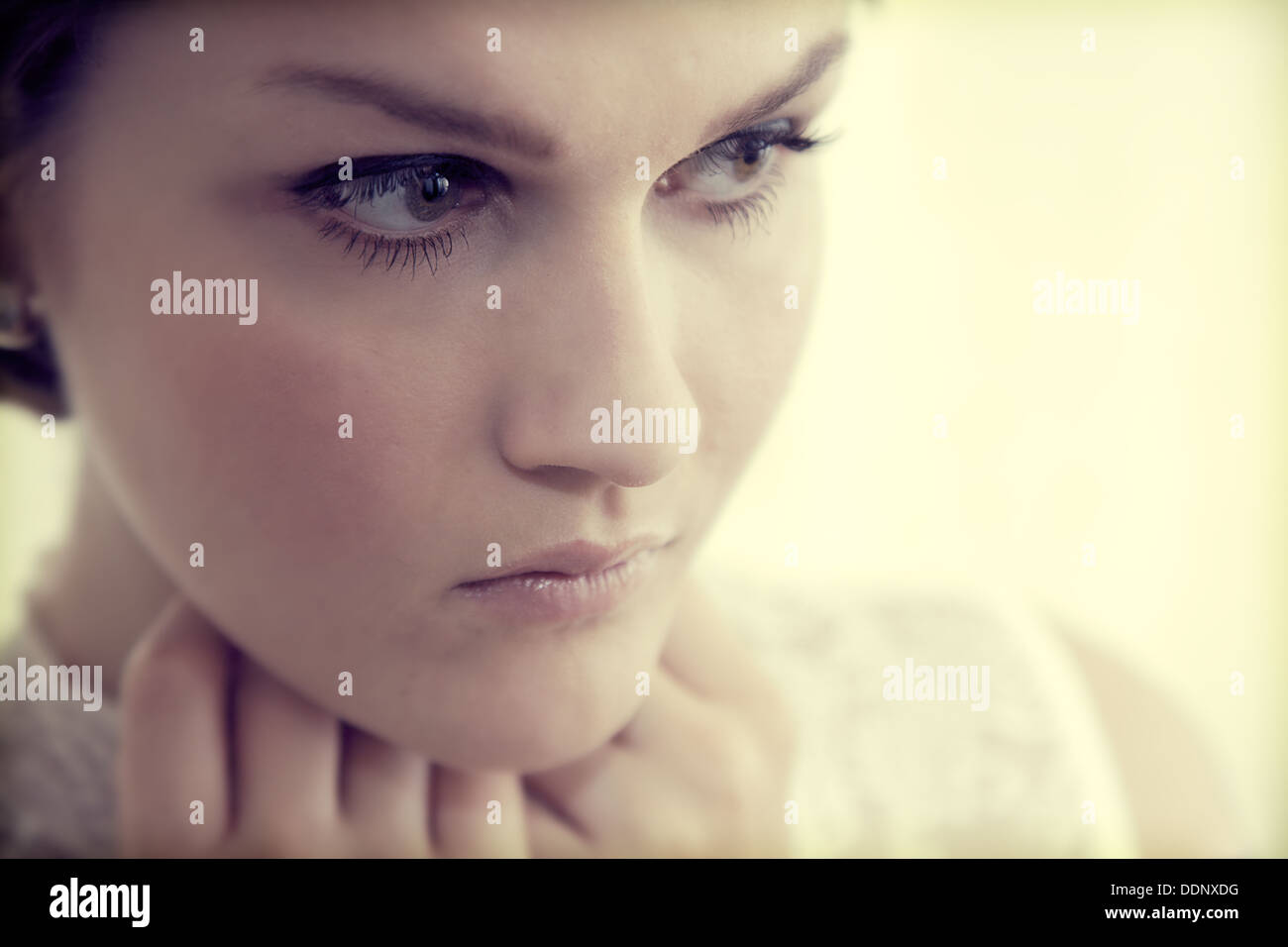 Worried / thinking / beautiful young woman Stock Photo - Alamy