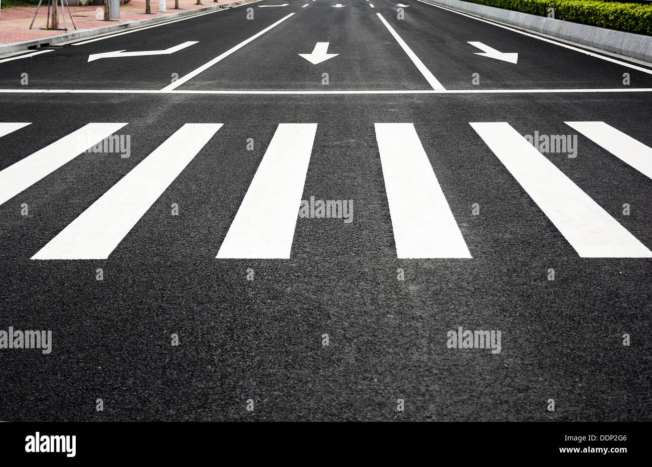 Highway with different arrows and Crosswalk Stock Photo - Alamy
