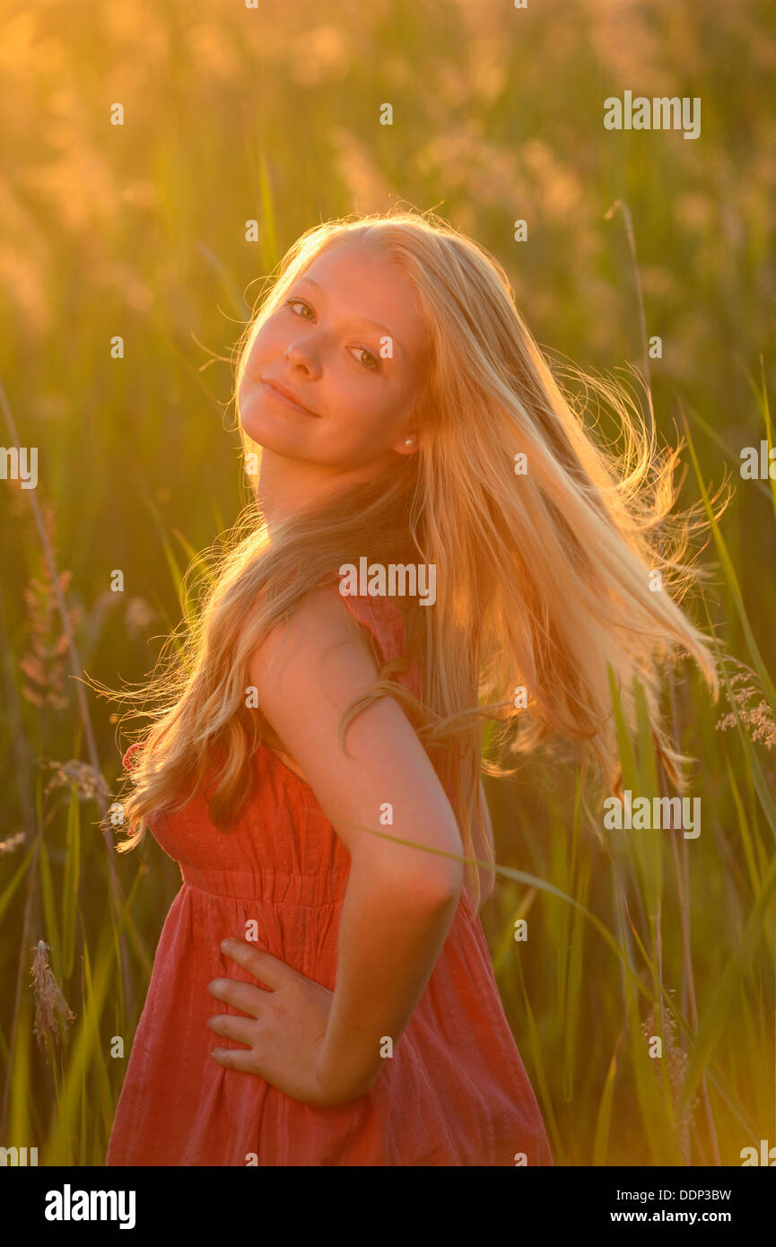 Young woman in the reeds Stock Photo - Alamy