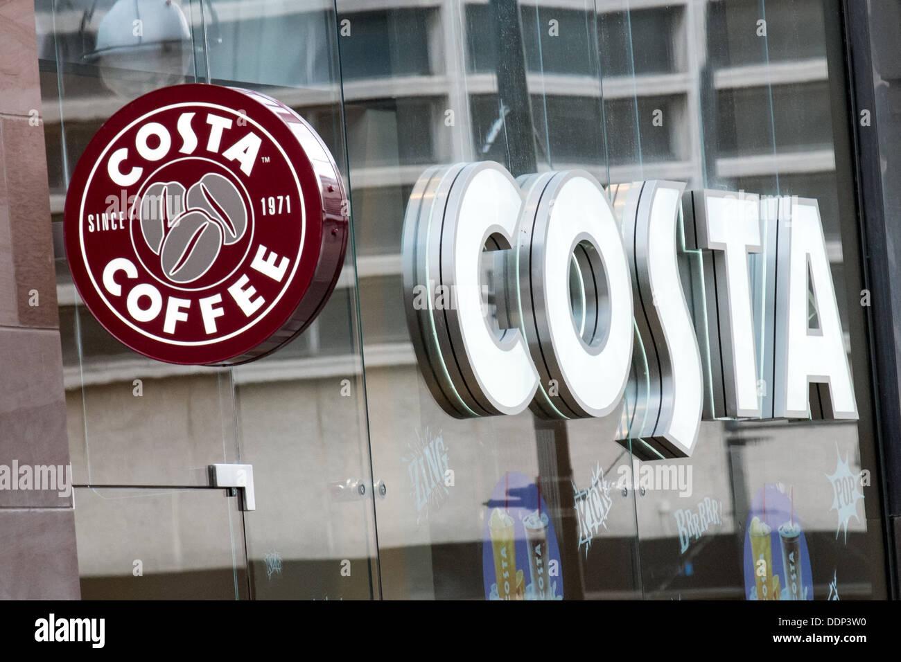 The Costa coffee signs on a glass fronted high street retail store in ...