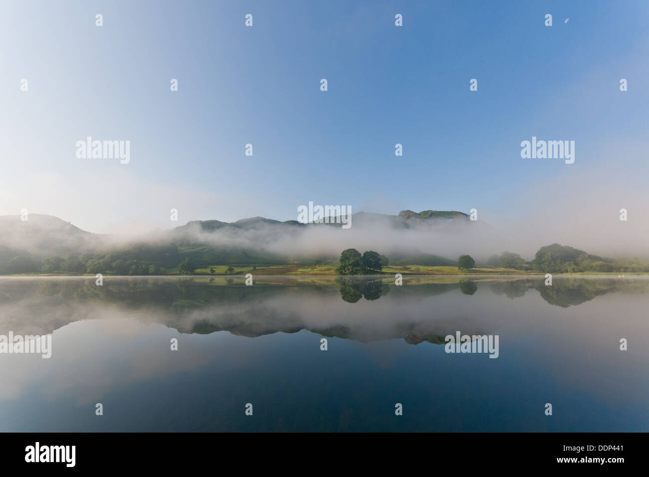 Mist rising over the water Stock Photo - Alamy