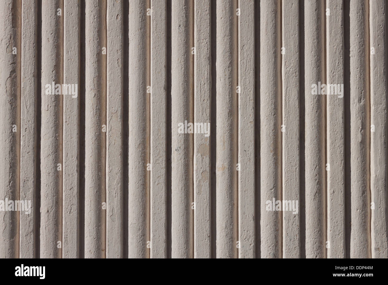 Vertical stony lines texture background with shadows Stock Photo - Alamy