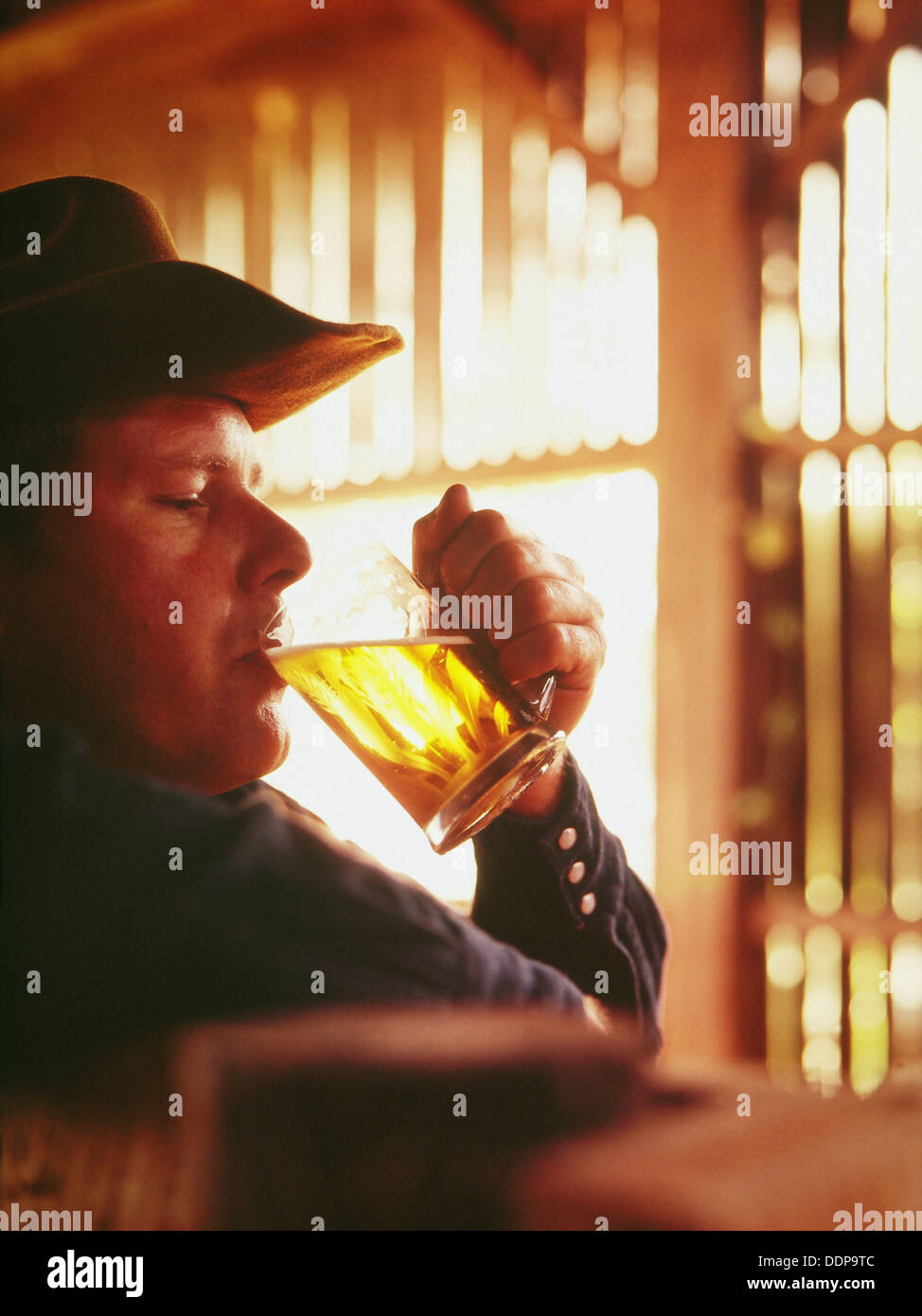 Cowboy drinking glass hi-res stock photography and images - Alamy