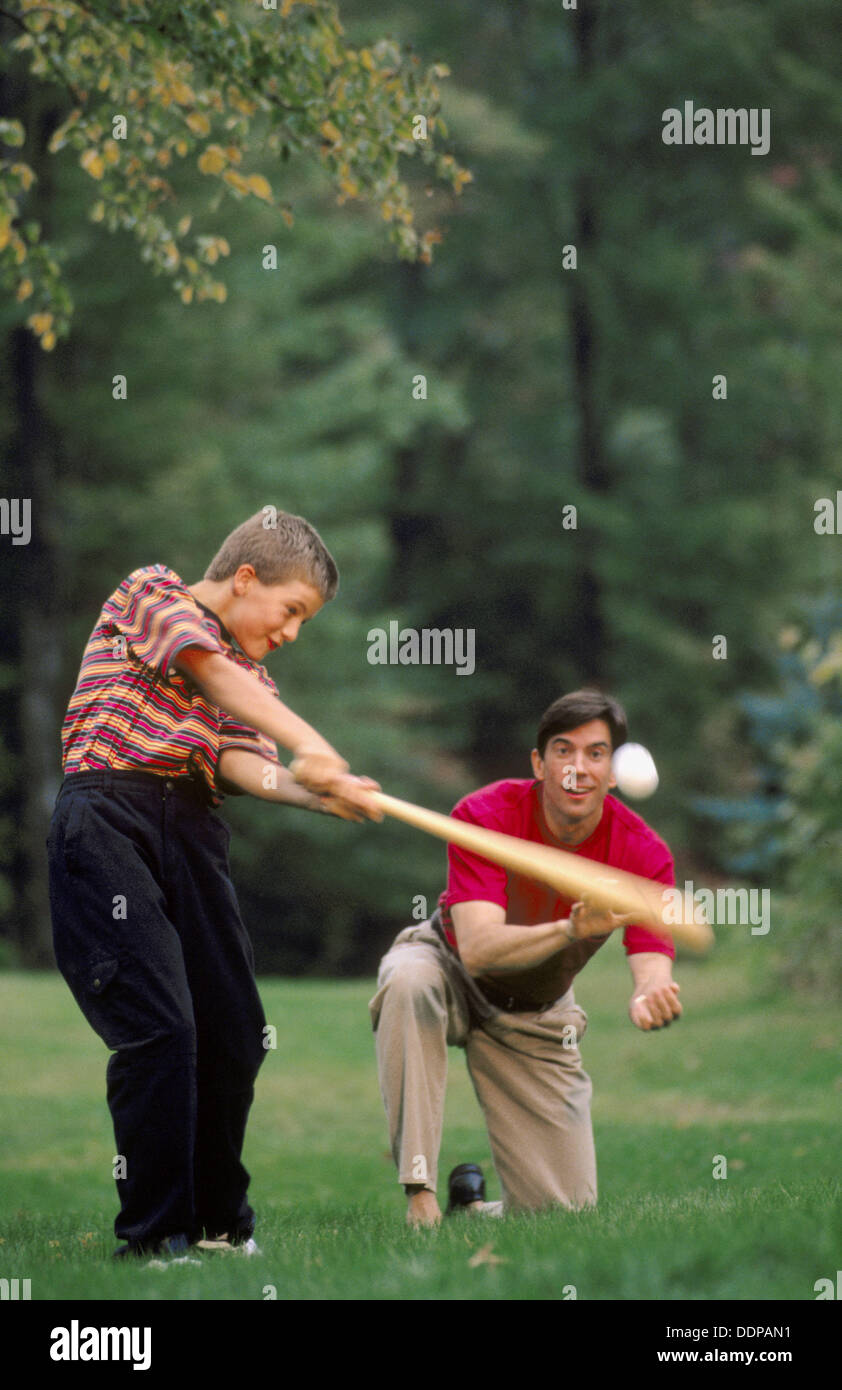 Child hitting softball hi-res stock photography and images - Alamy
