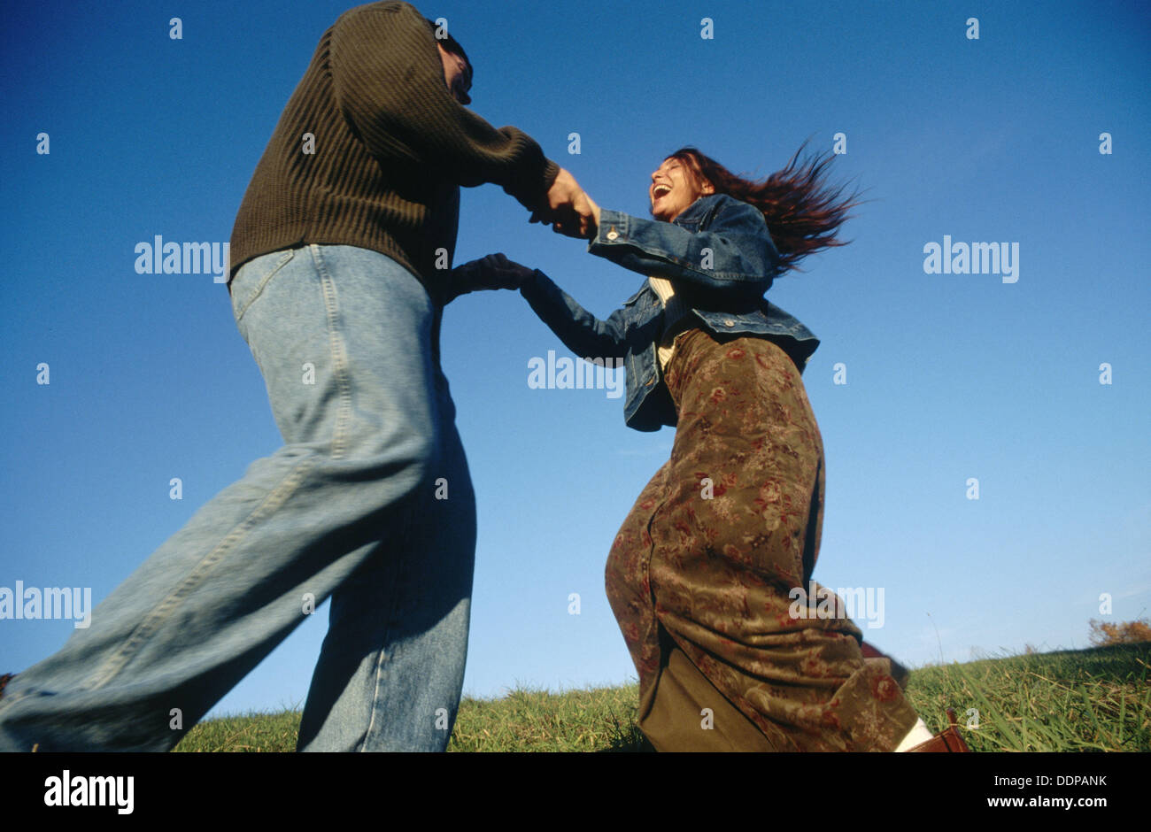 Couple and twirling hi-res stock photography and images - Alamy