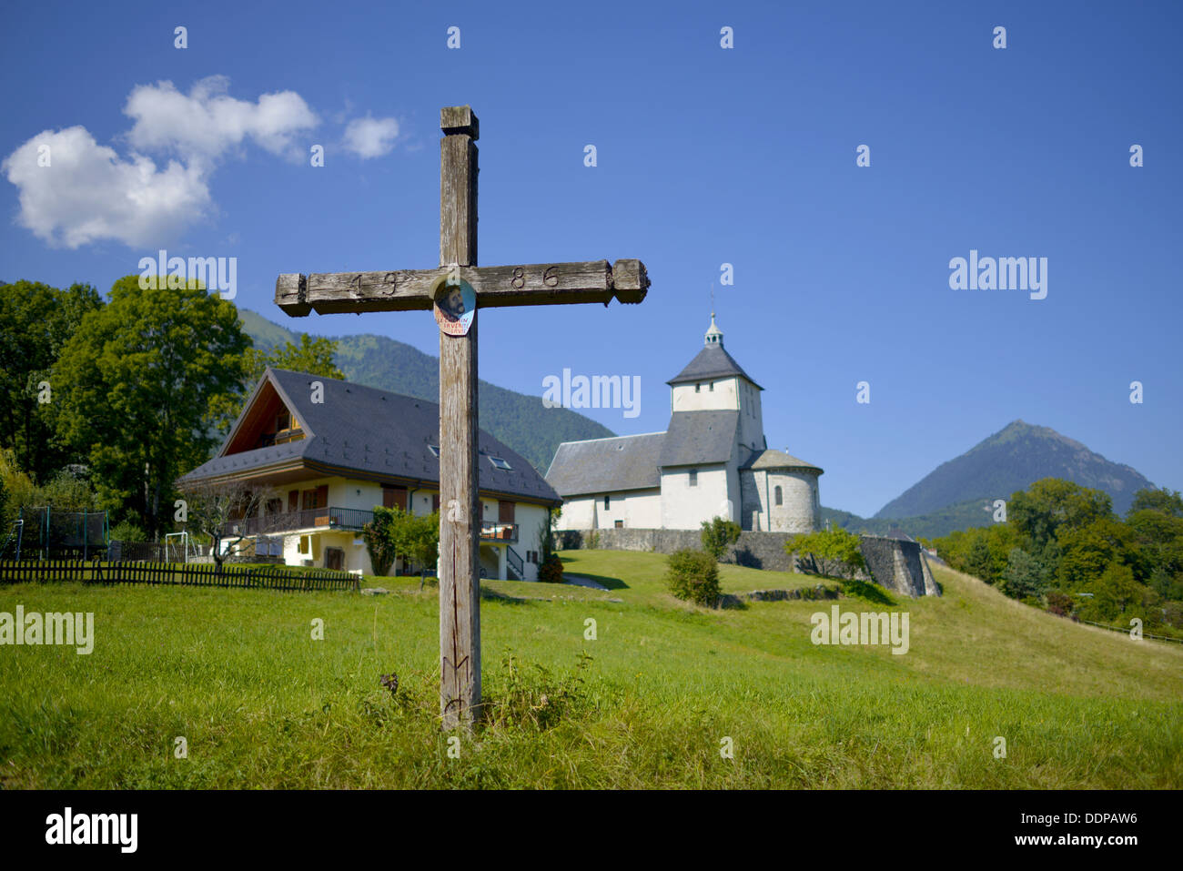 Cross and church Stock Photo - Alamy