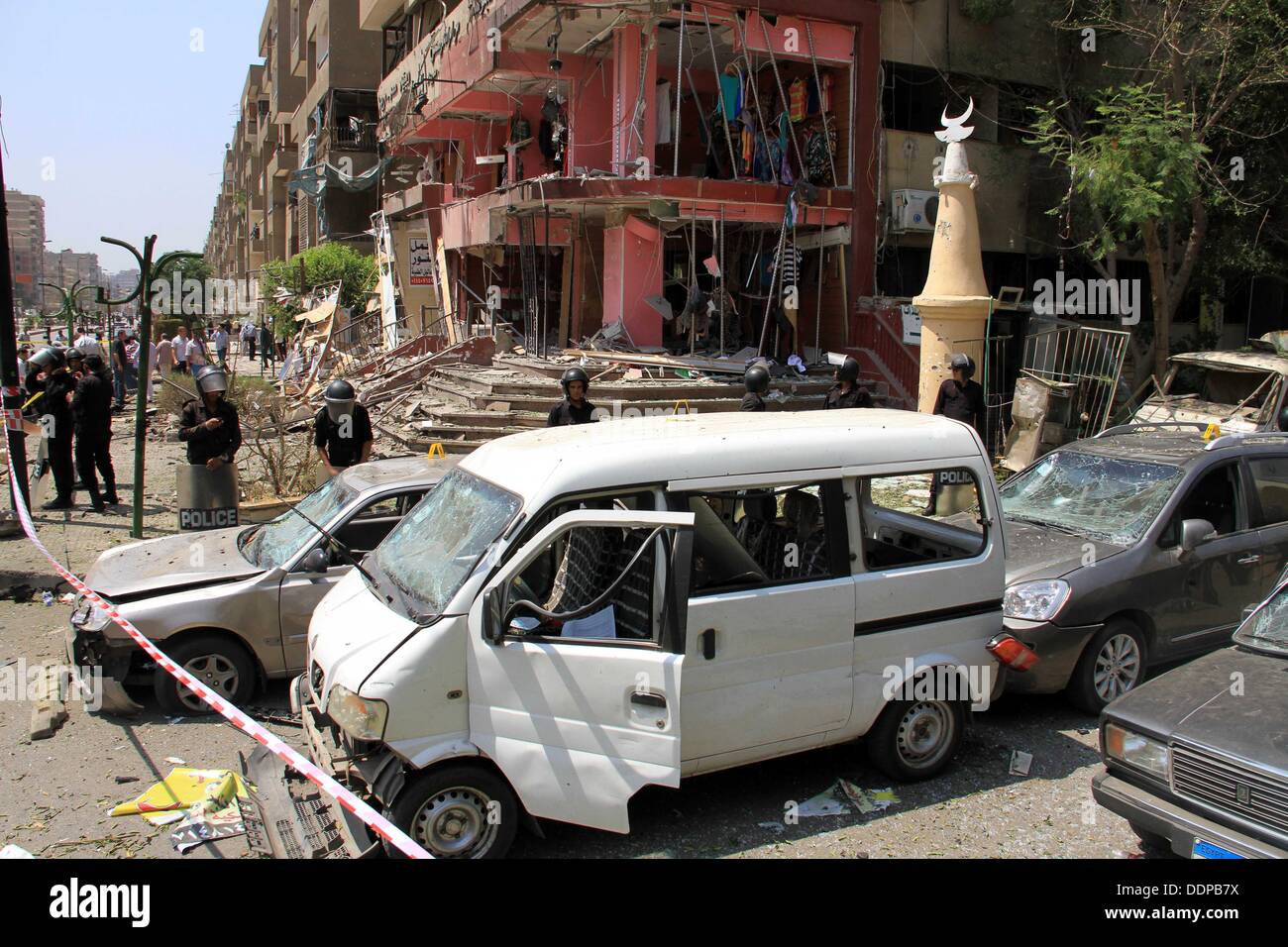 Cairo, Cairo, Egypt. 5th Sep, 2013. Egyptian security personnel gather at the scene of a bomb ...