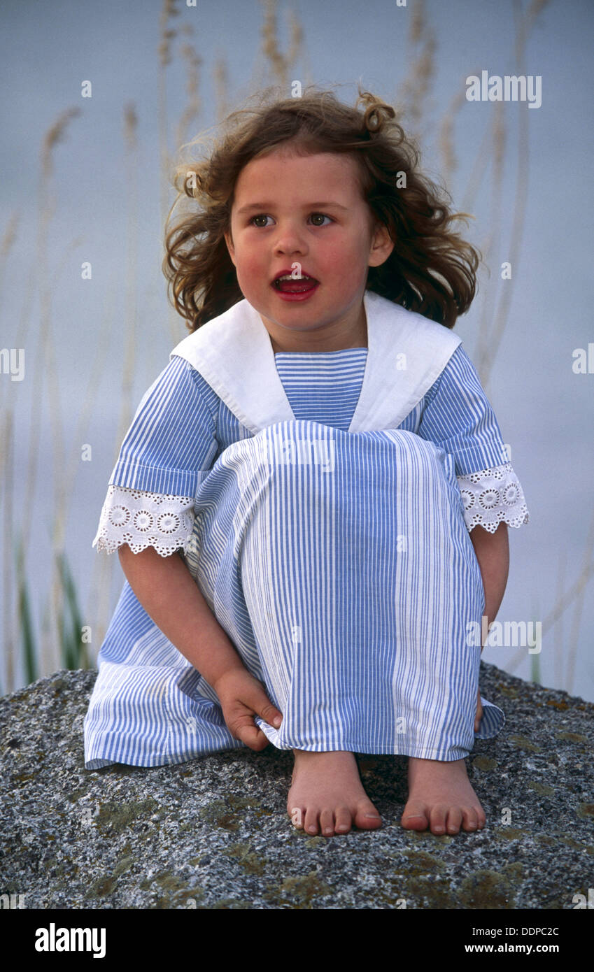 Little girl on a rock. Öland. Sweden Stock Photo - Alamy