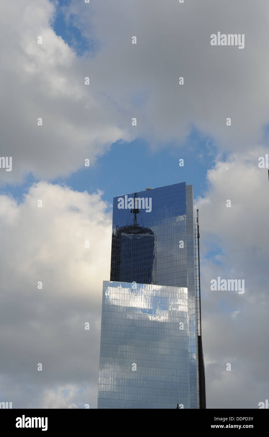 1 World Trade Center is reflected in the facade of 4 World Trade Center ...