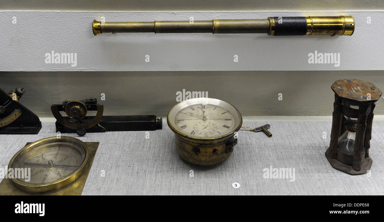 Old navigational instruments. Vintage telescope, compass, hourglass ... Old navigational instruments. Vintage telescope, compass, hourglass ...