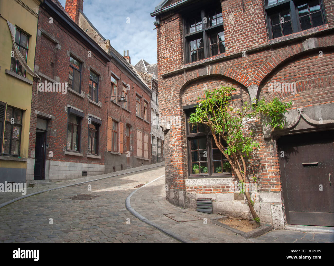 Cobbled street with traditional housing in the old quarter of Mons in ...